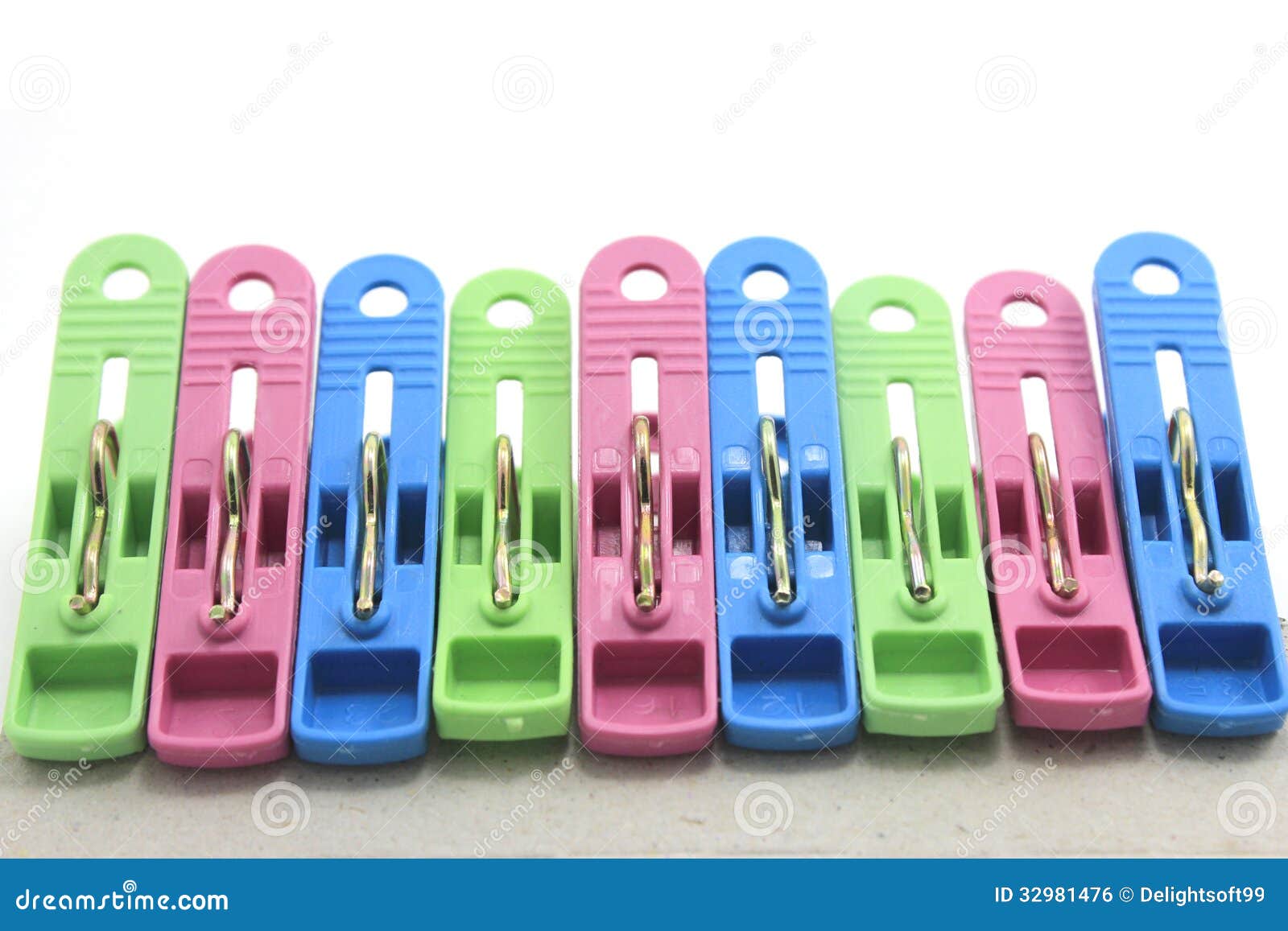 Row of peg package stock photo. Image of plain, laundry - 32981476