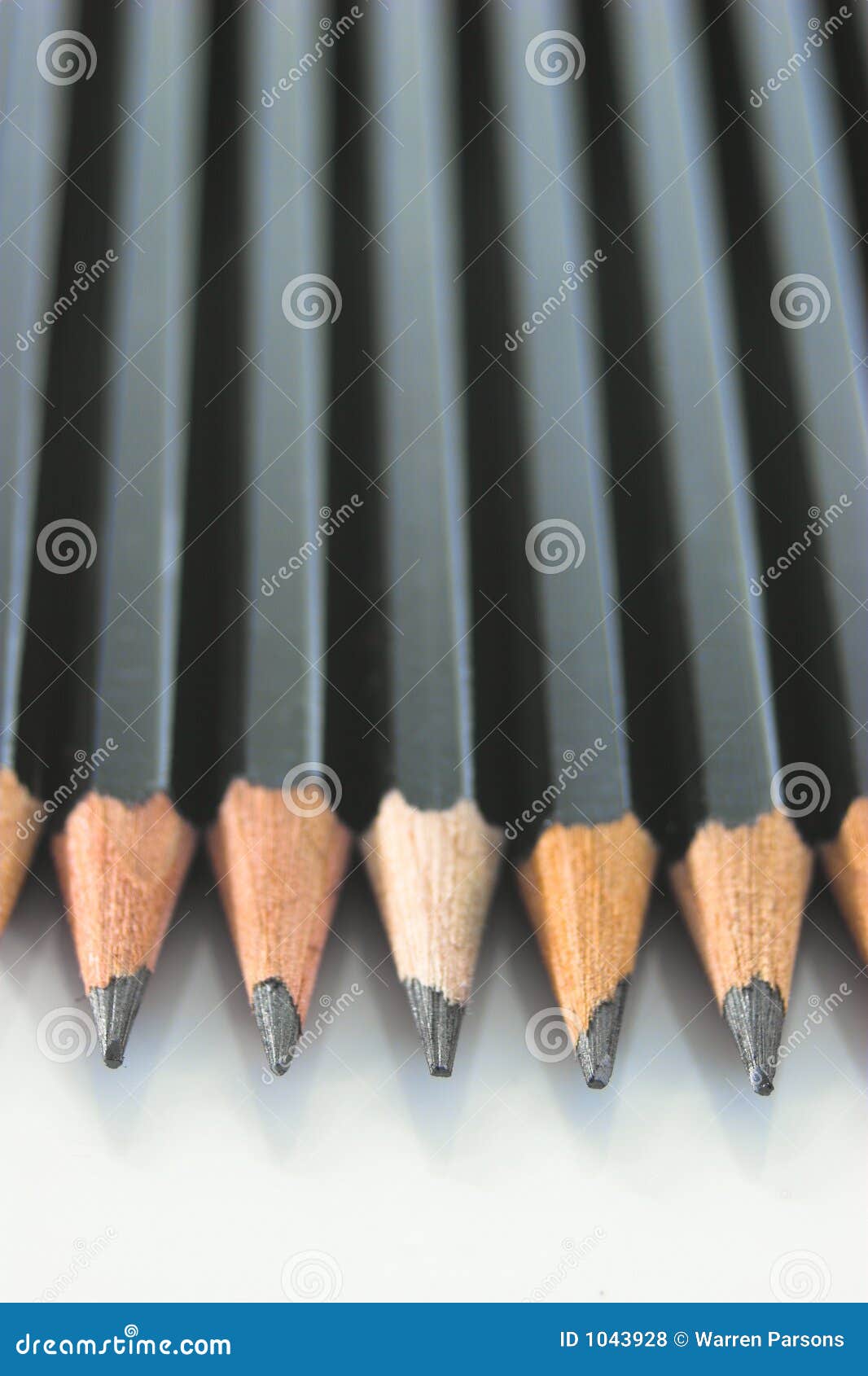 Row of pencils - vertical stock photo. Image of shallow - 1043928