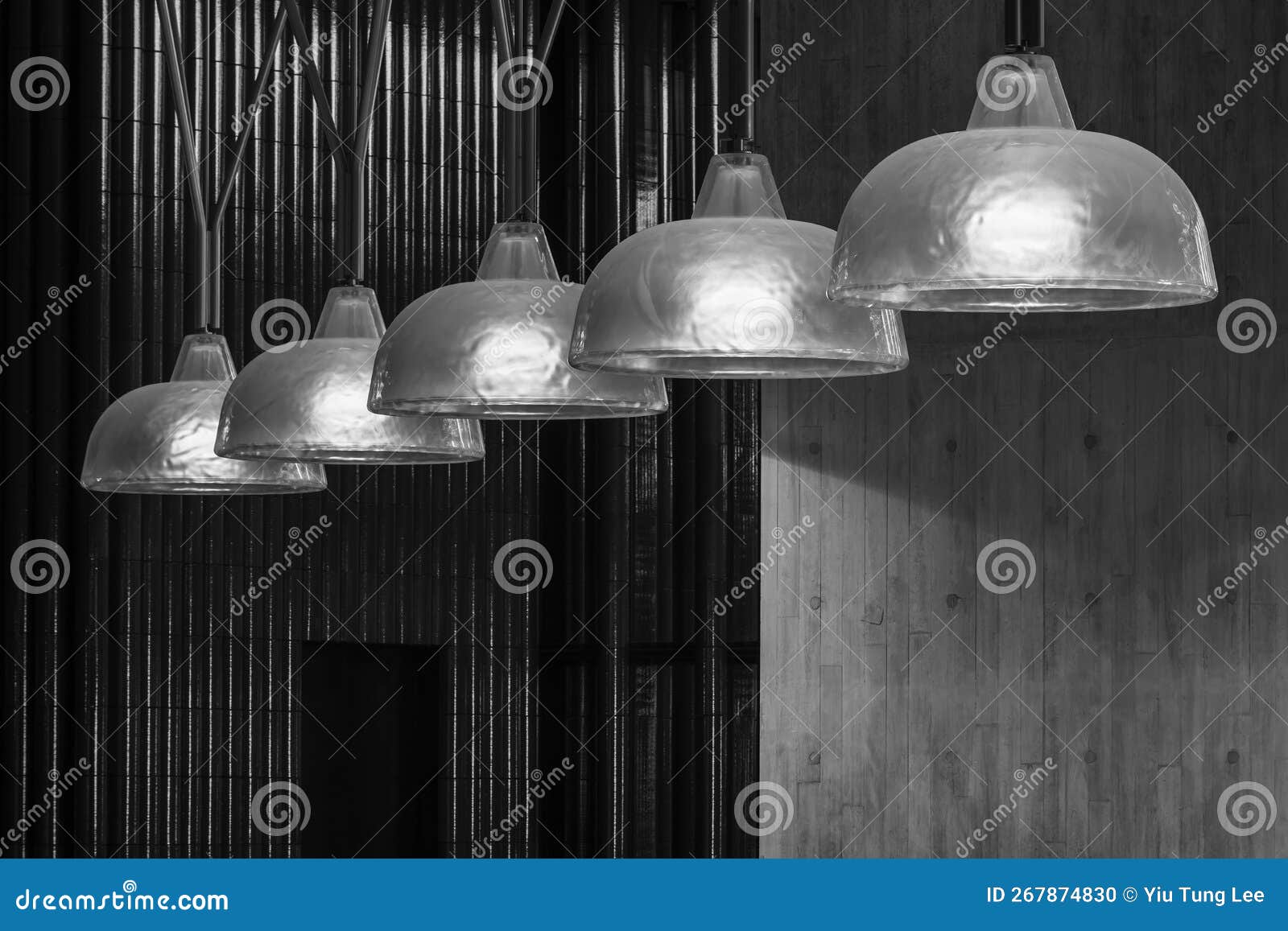 Row of Pendant Light Lamps Set in Modern Interior Stock Photo - Image ...