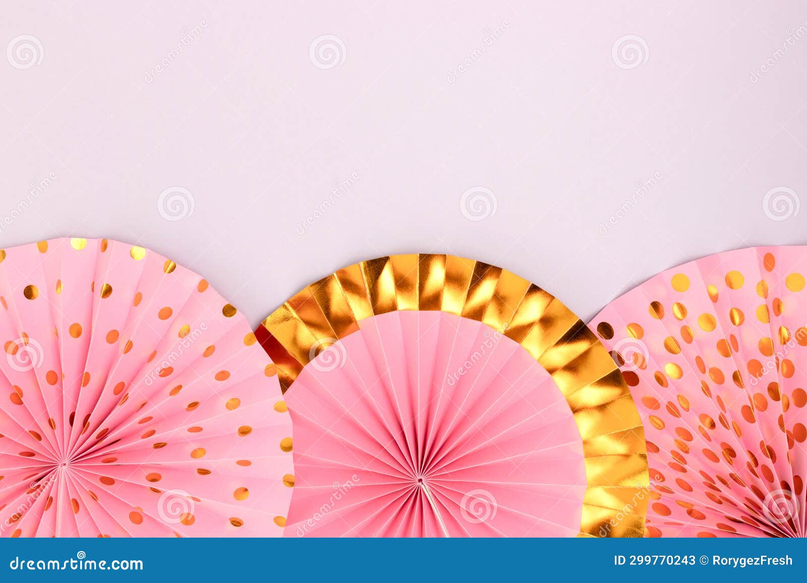 Row of Pink Paper Fans on a Blue Background. Stock Image - Image of ...