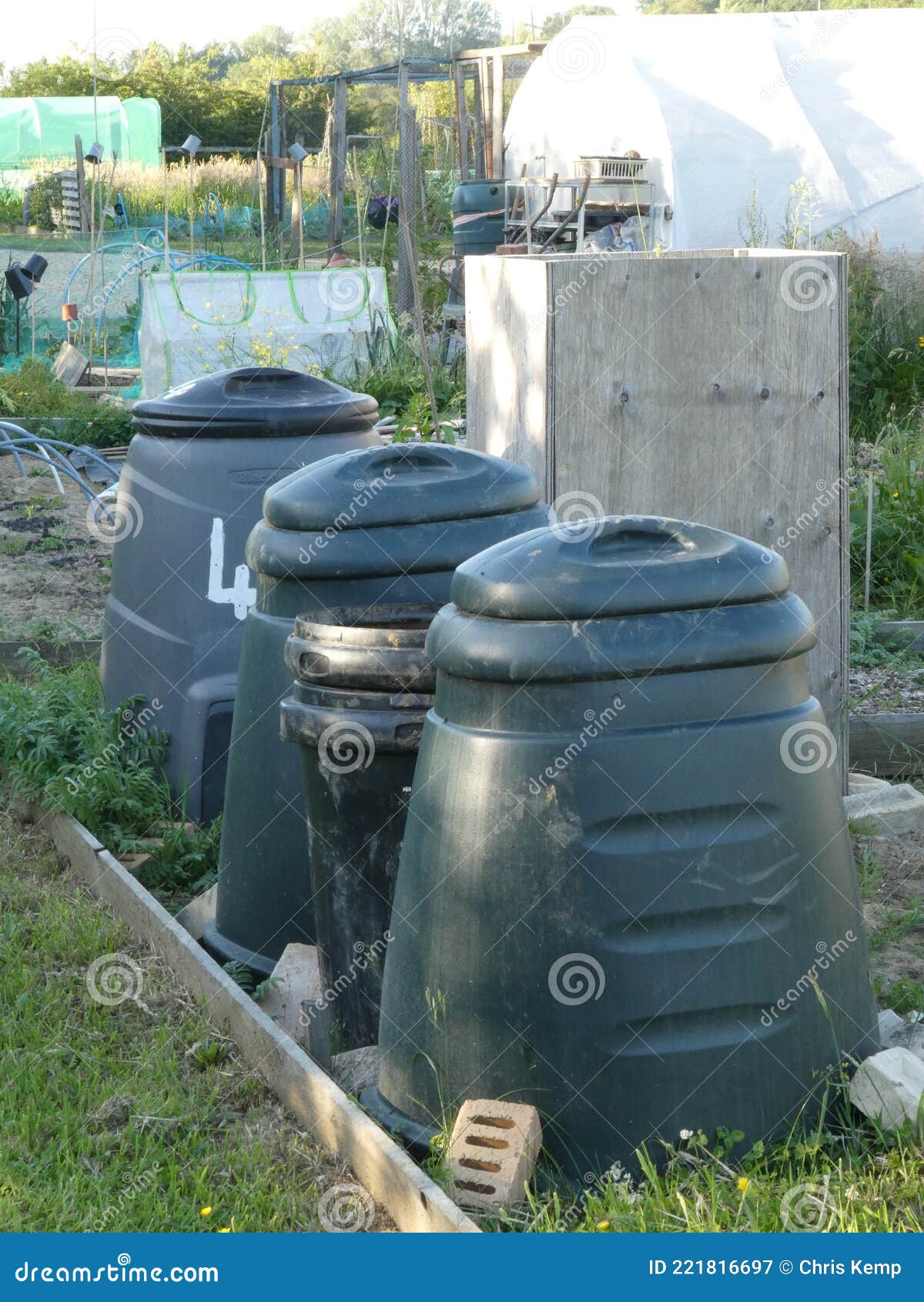 A Row of Plastic Compost Bins on a Typical Allotment Stock Image ...