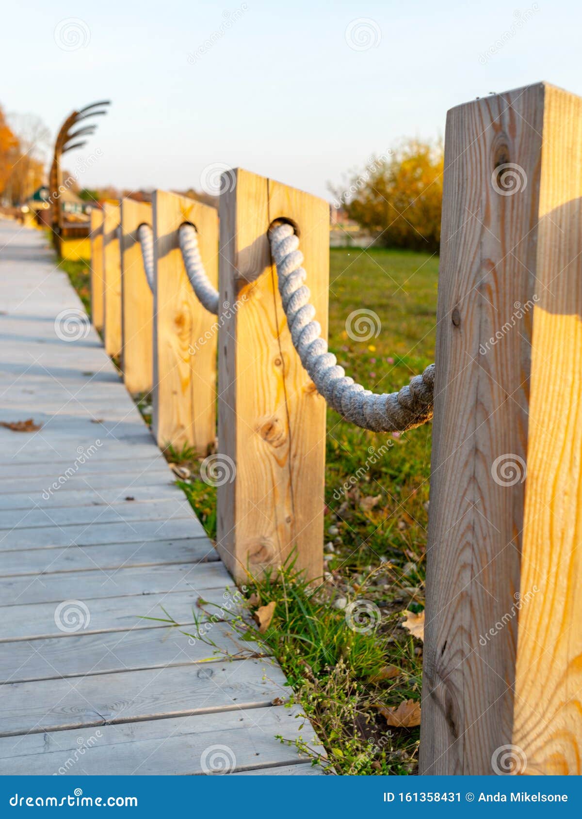 Row of Poles Along Pedestrian Path Stock Image - Image of beautiful ...