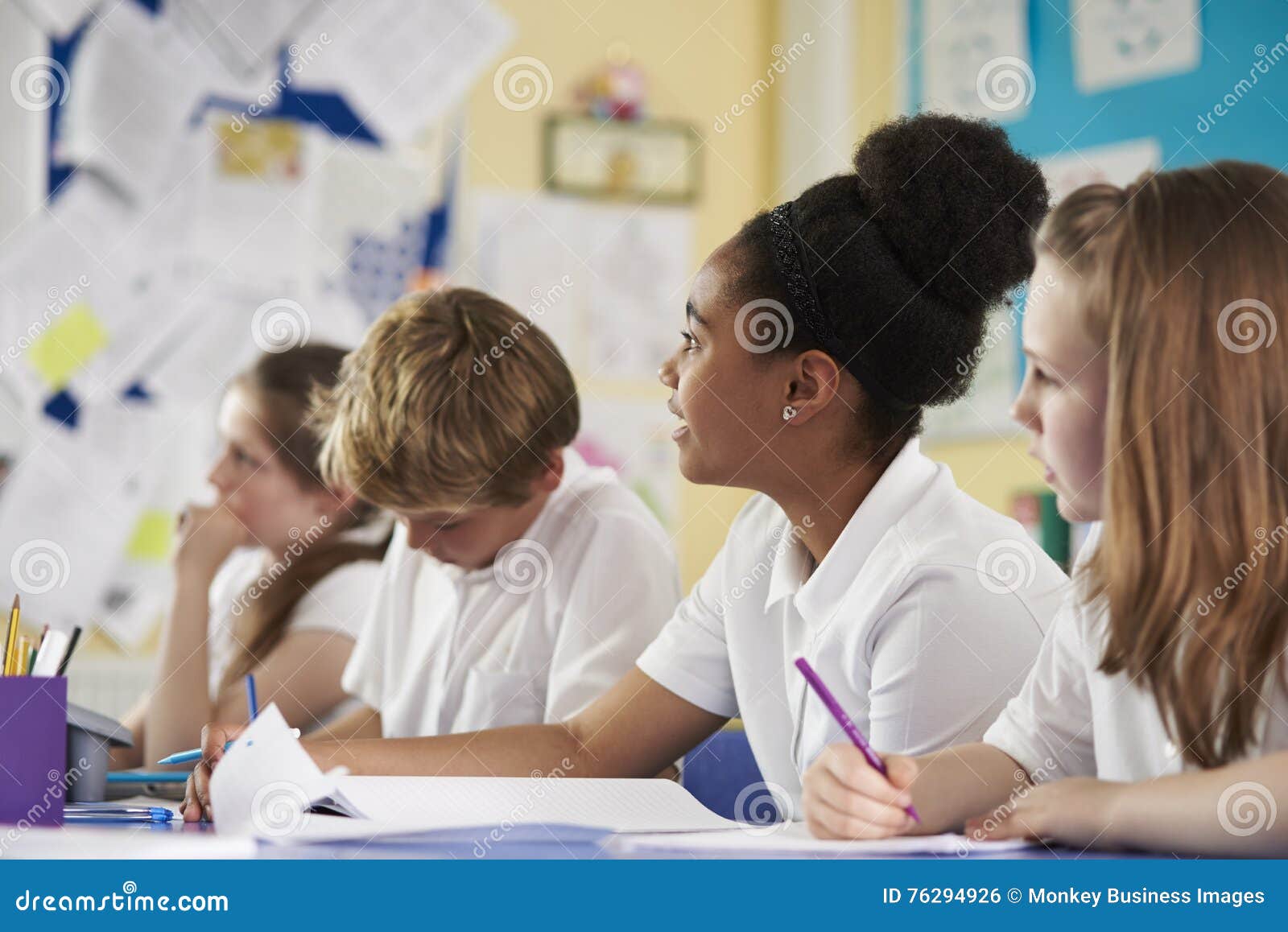 A Row of Primary School Children in Class, Close Up Stock Photo - Image ...