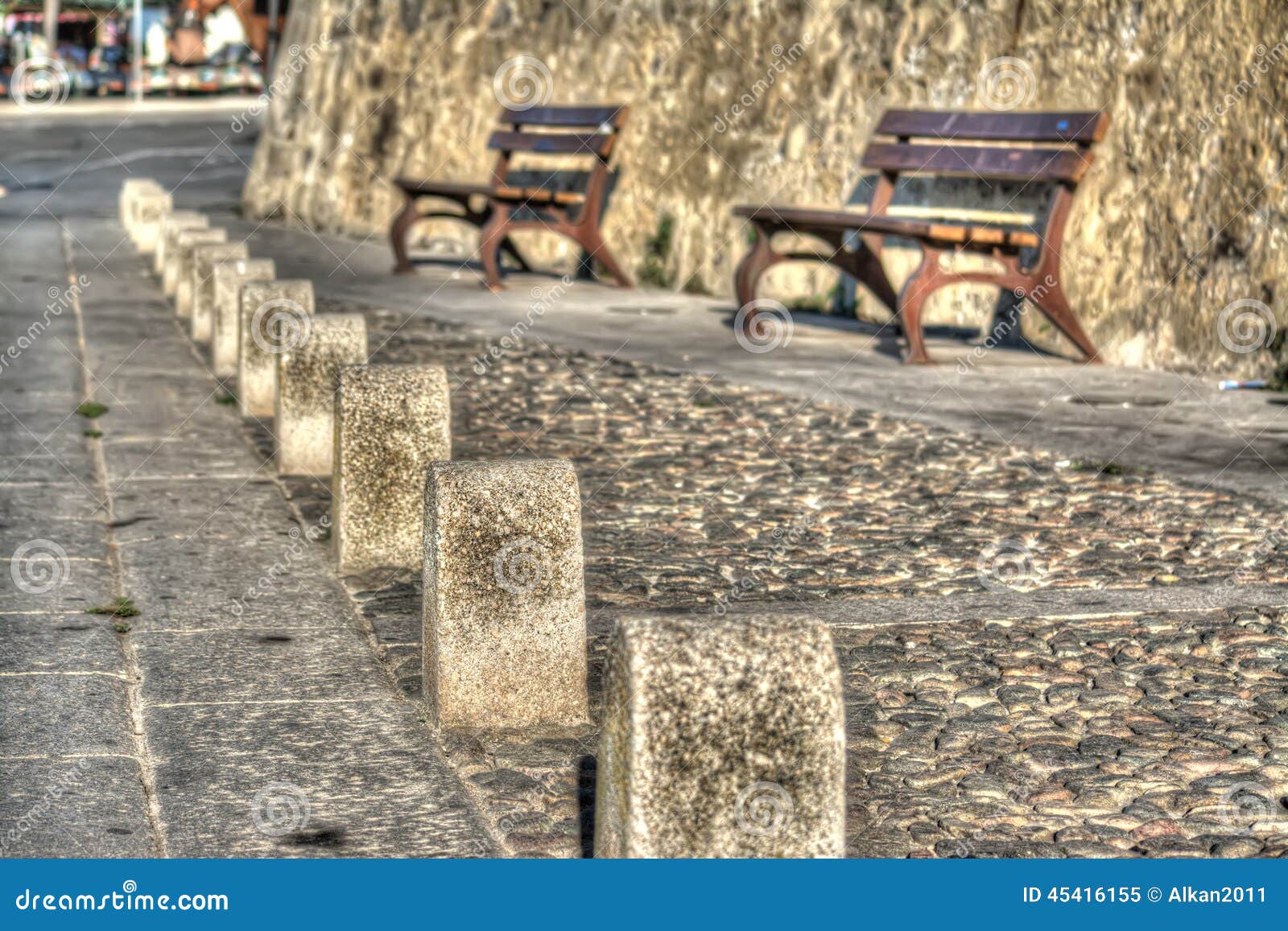 Row of pylons stock image. Image of paved, external, bench - 45416155
