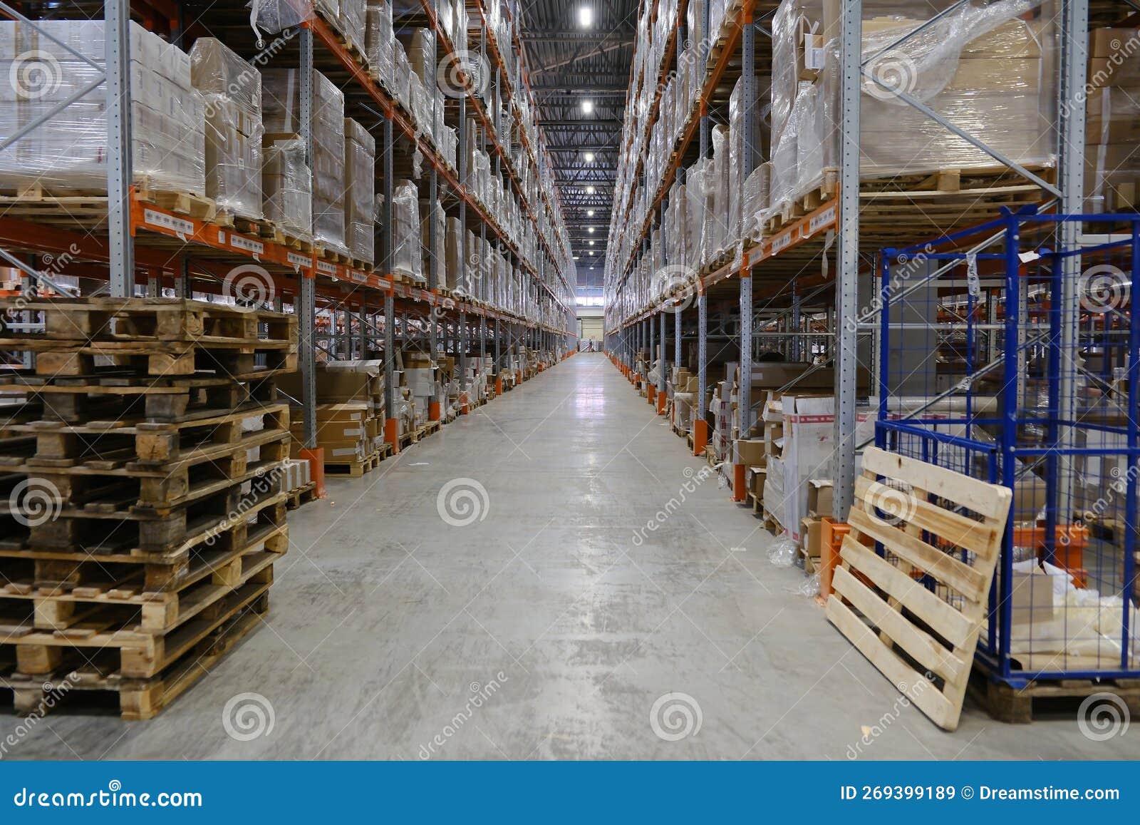 Row with Racks of Goods on Shelves Inside Warehouse Stock Image - Image ...