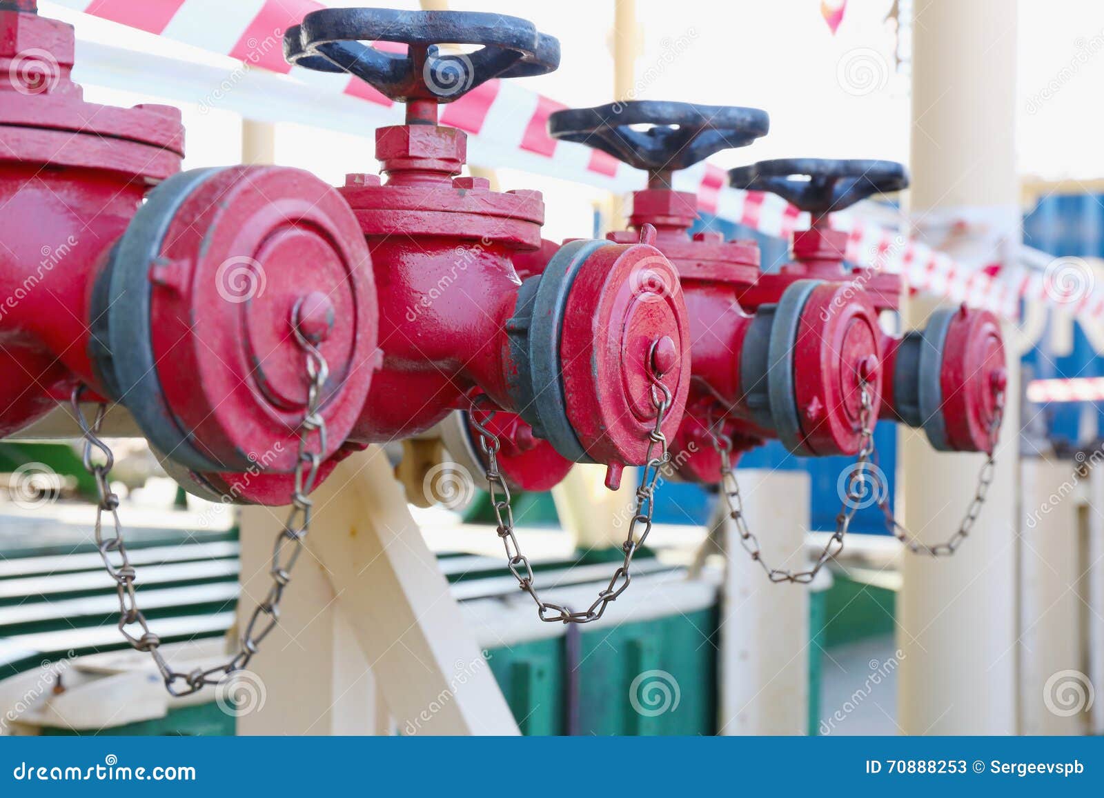 Row of red fire hydrants stock image. Image of color - 70888253
