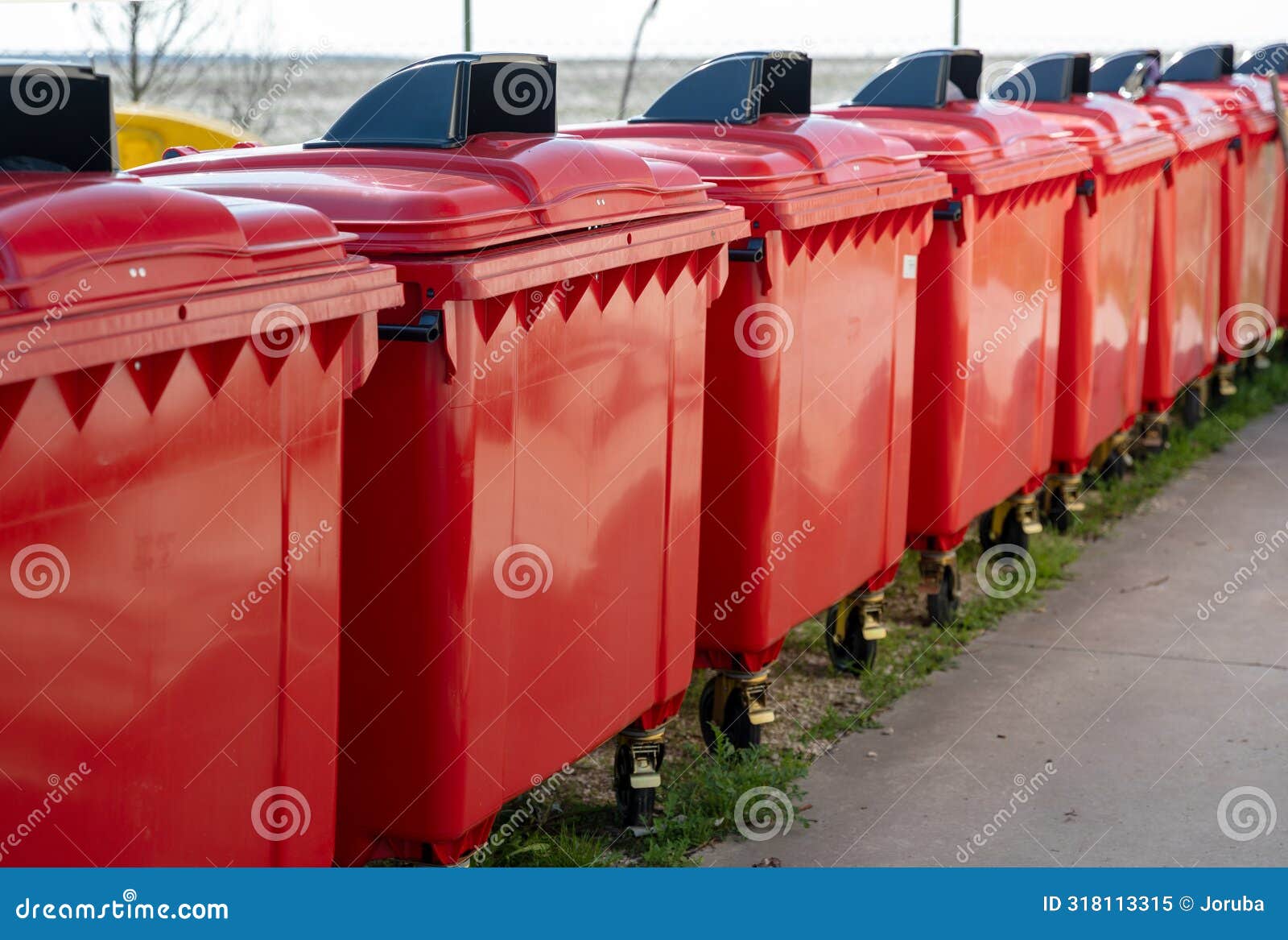Row of Red Waste Collecting Container Stock Image - Image of street ...
