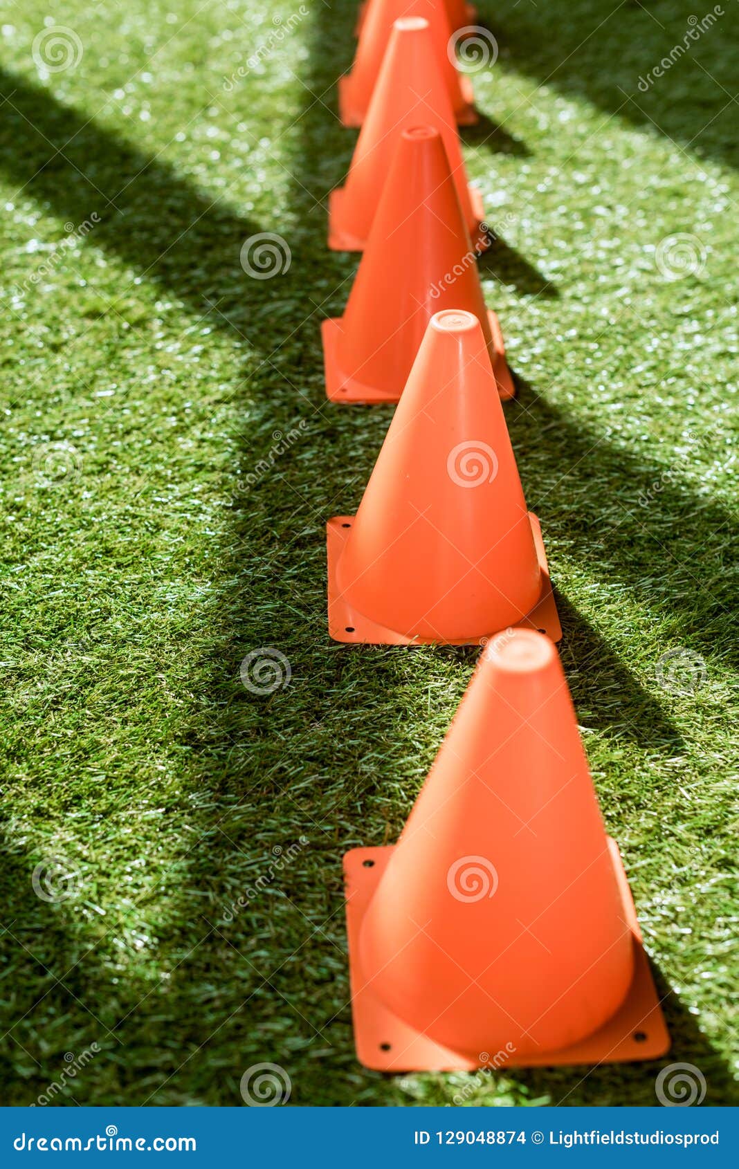 Row of Safety Cones Standing Stock Photo - Image of grass, sport: 129048874