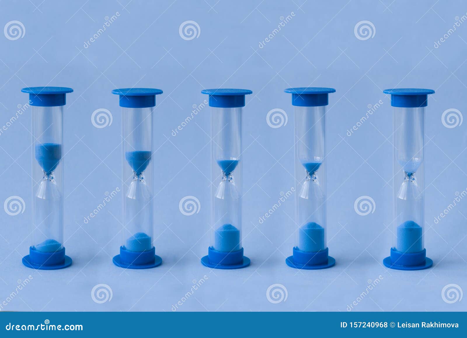 Row of Sand Watches with Different Level of Falling Sand Inside of Them ...