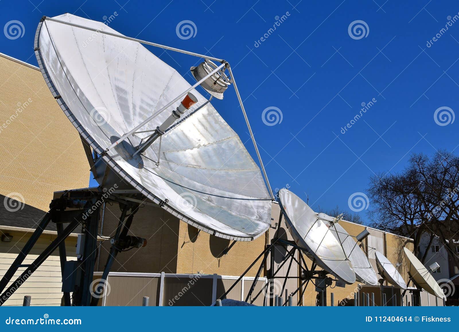 Row of satellite dishes stock photo. Image of dish, channels - 112404614