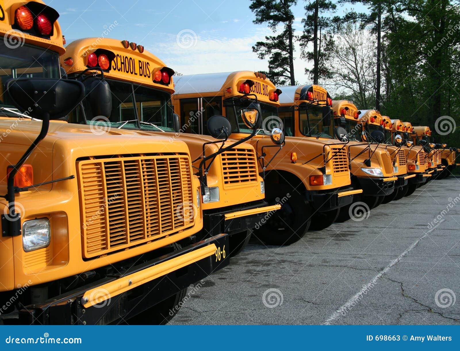 Row of school buses stock image. Image of travel, transport - 698663