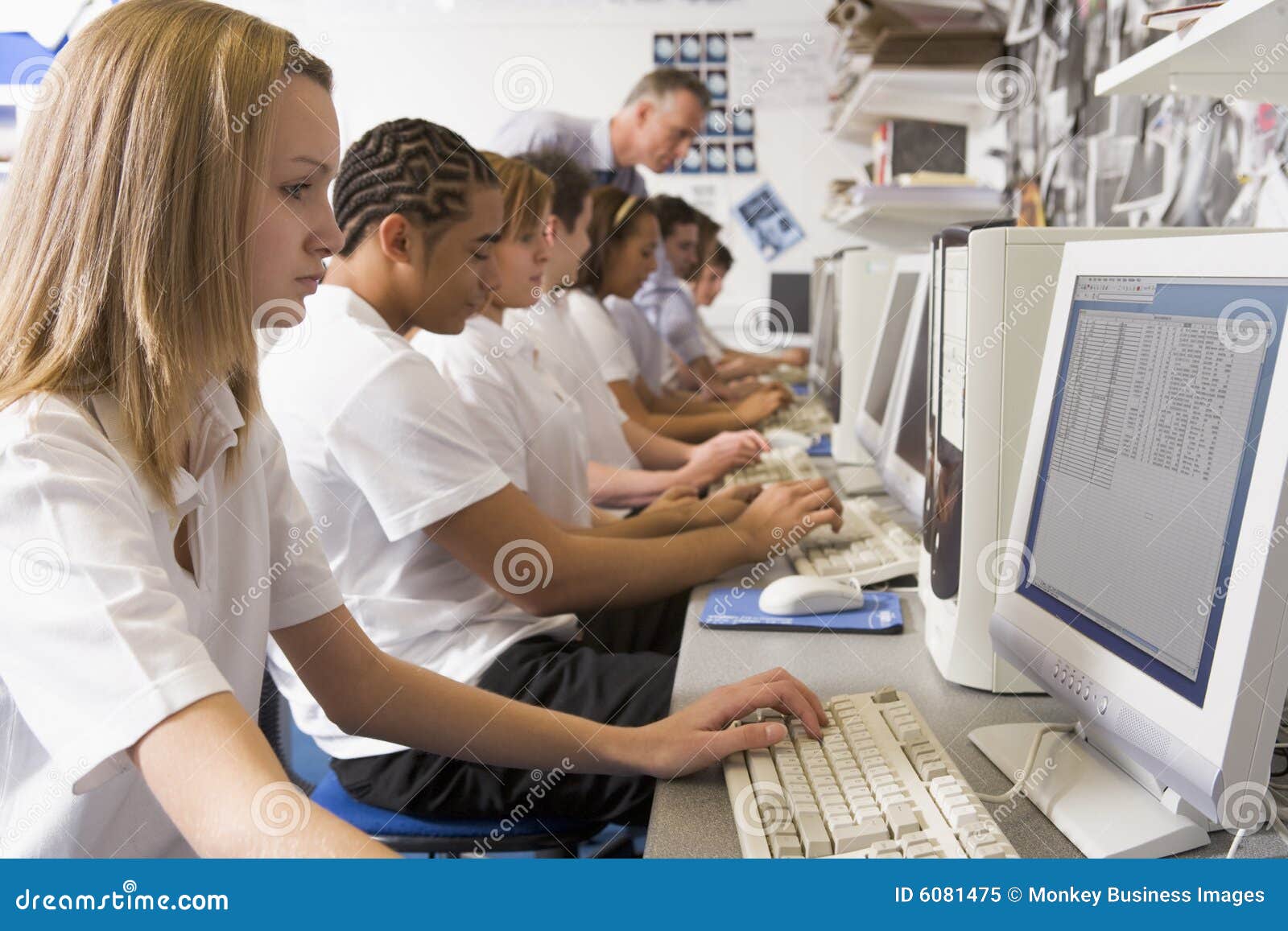 Row of Schoolchildren Studying on Computers Stock Image - Image of ...