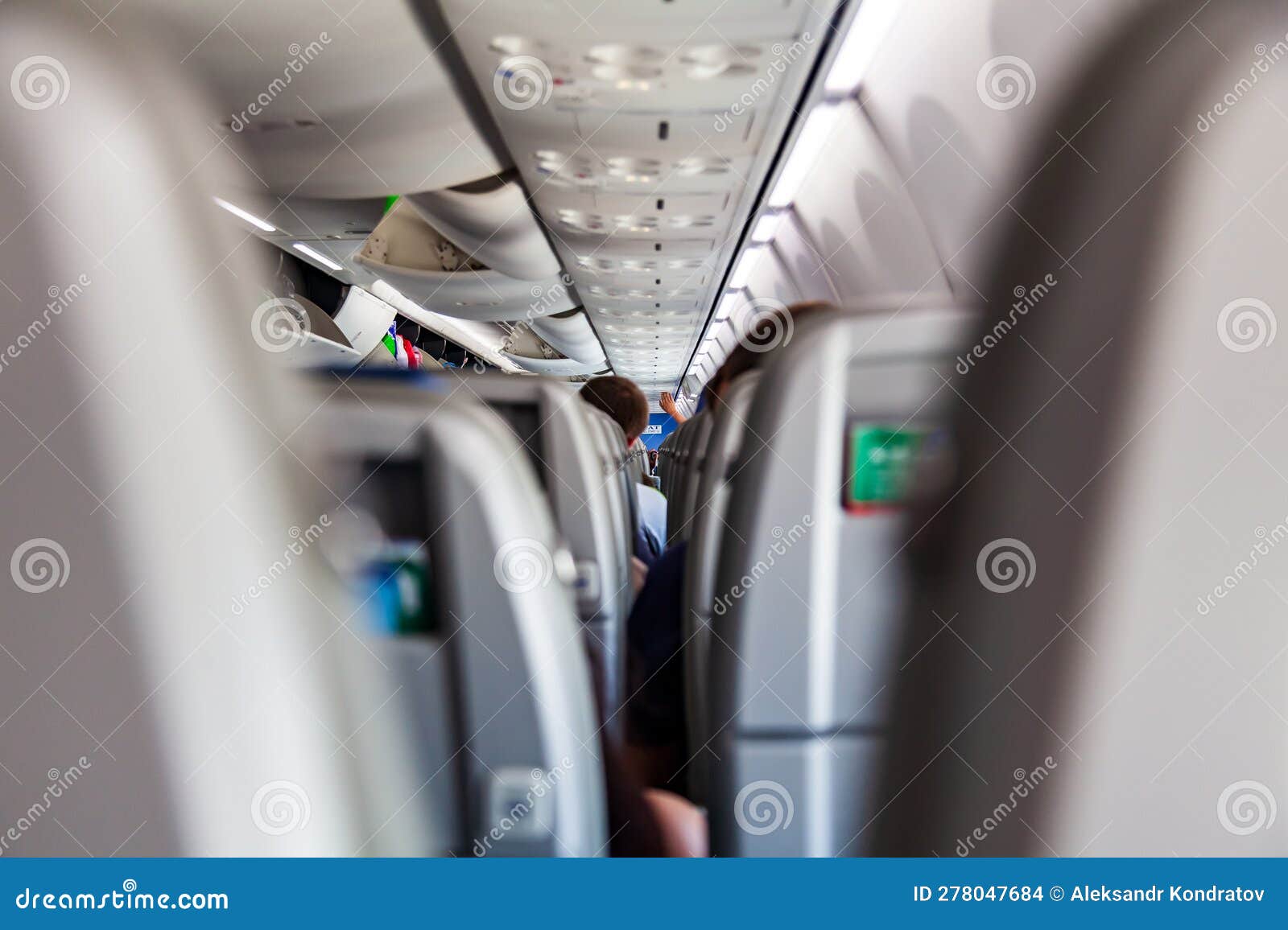A Row of Seats for Passengers in an Airplane in Perspective Stock Photo ...