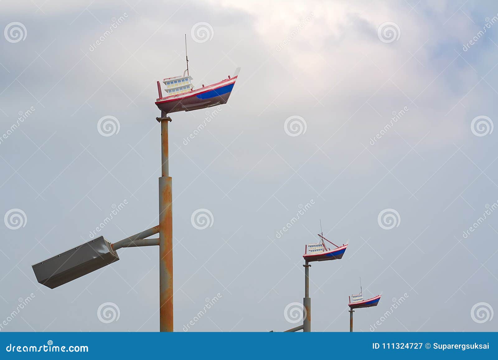A Row of Ship Shaped Lighting Pillars Stock Image - Image of summer ...