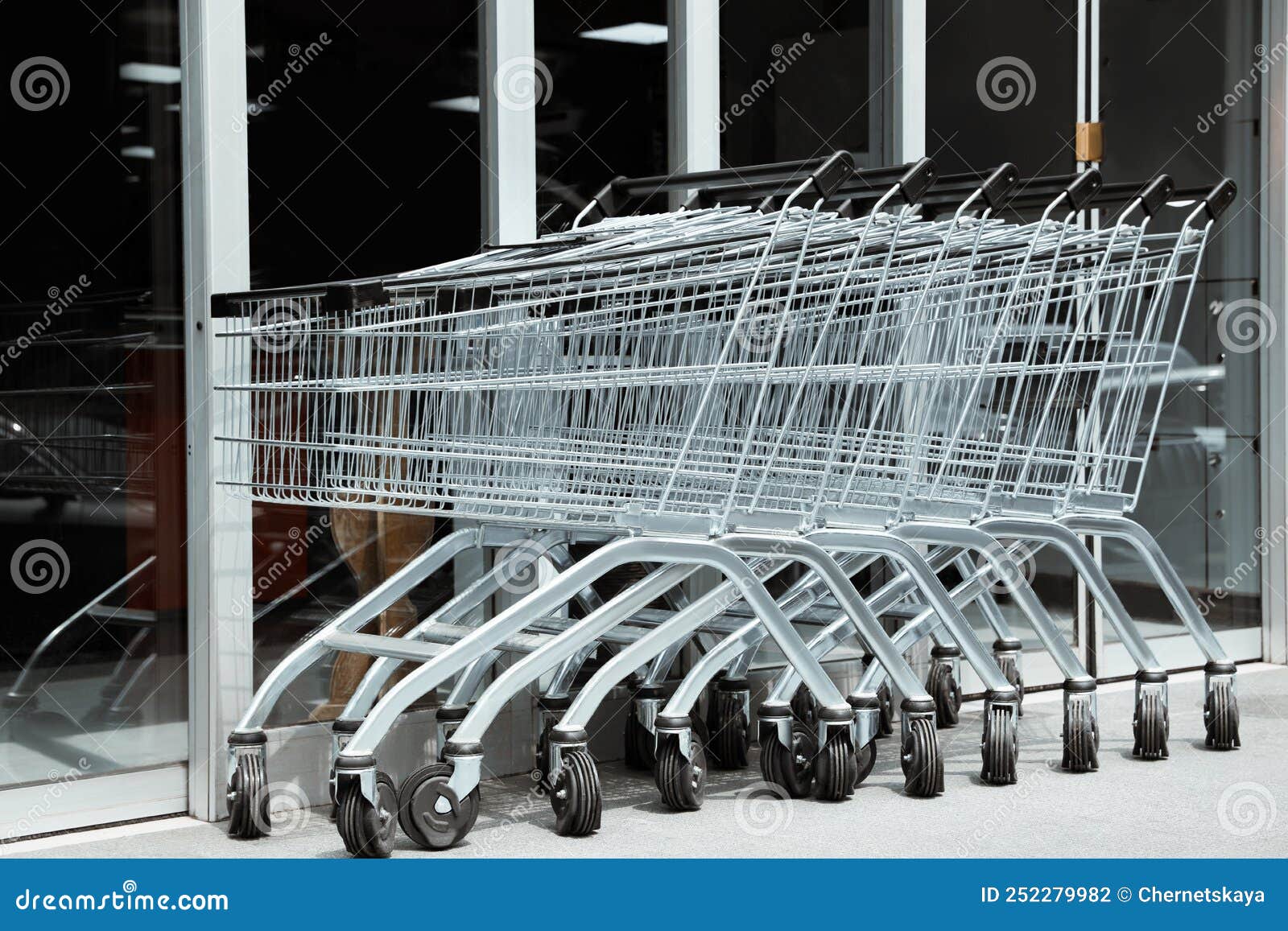 Row of Shopping Carts Near Store Outdoors Stock Photo - Image of ...