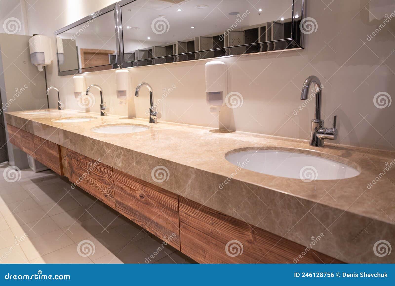 A Row of Sinks in the Sports Shower and Changing Room Stock Photo ...