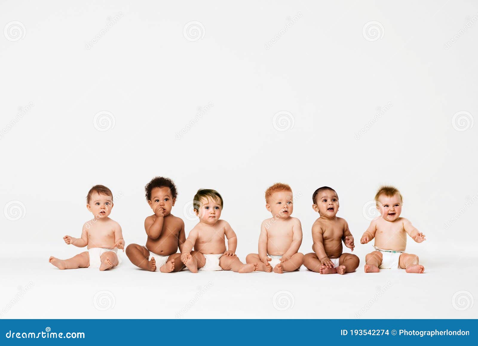 Row of Six Multi Ethnic Babies Smiling in Studio Stock Photo - Image of ...