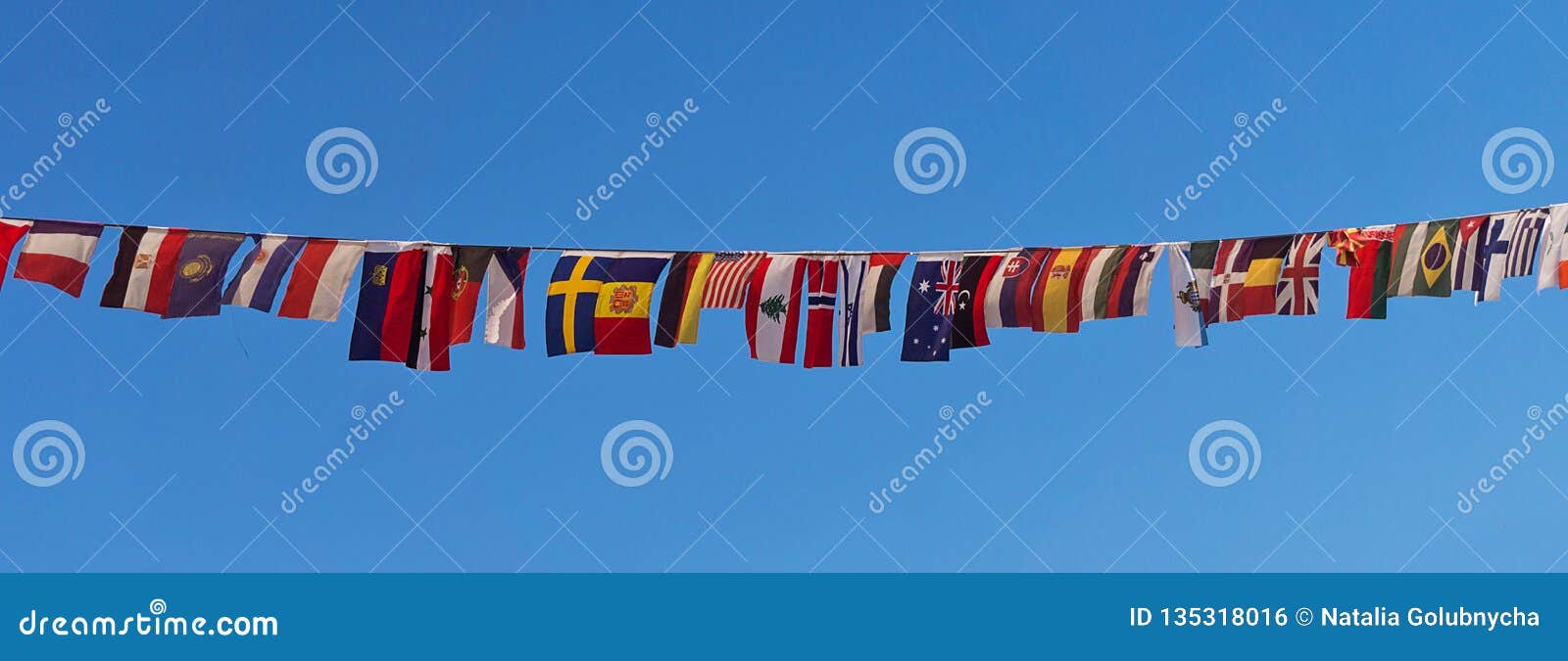 Row of Small Flags of Different Countries on a Rope Stock Photo - Image ...