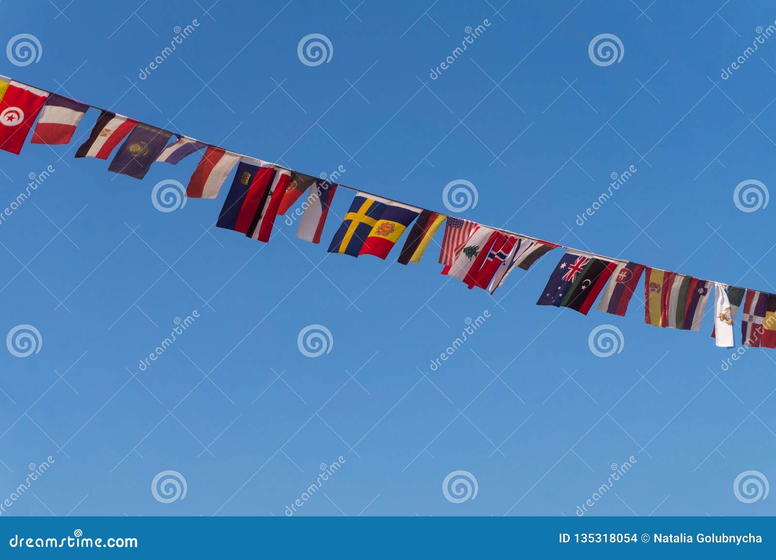 Row of Small Flags of Different Countries on a Rope Stock Photo - Image ...
