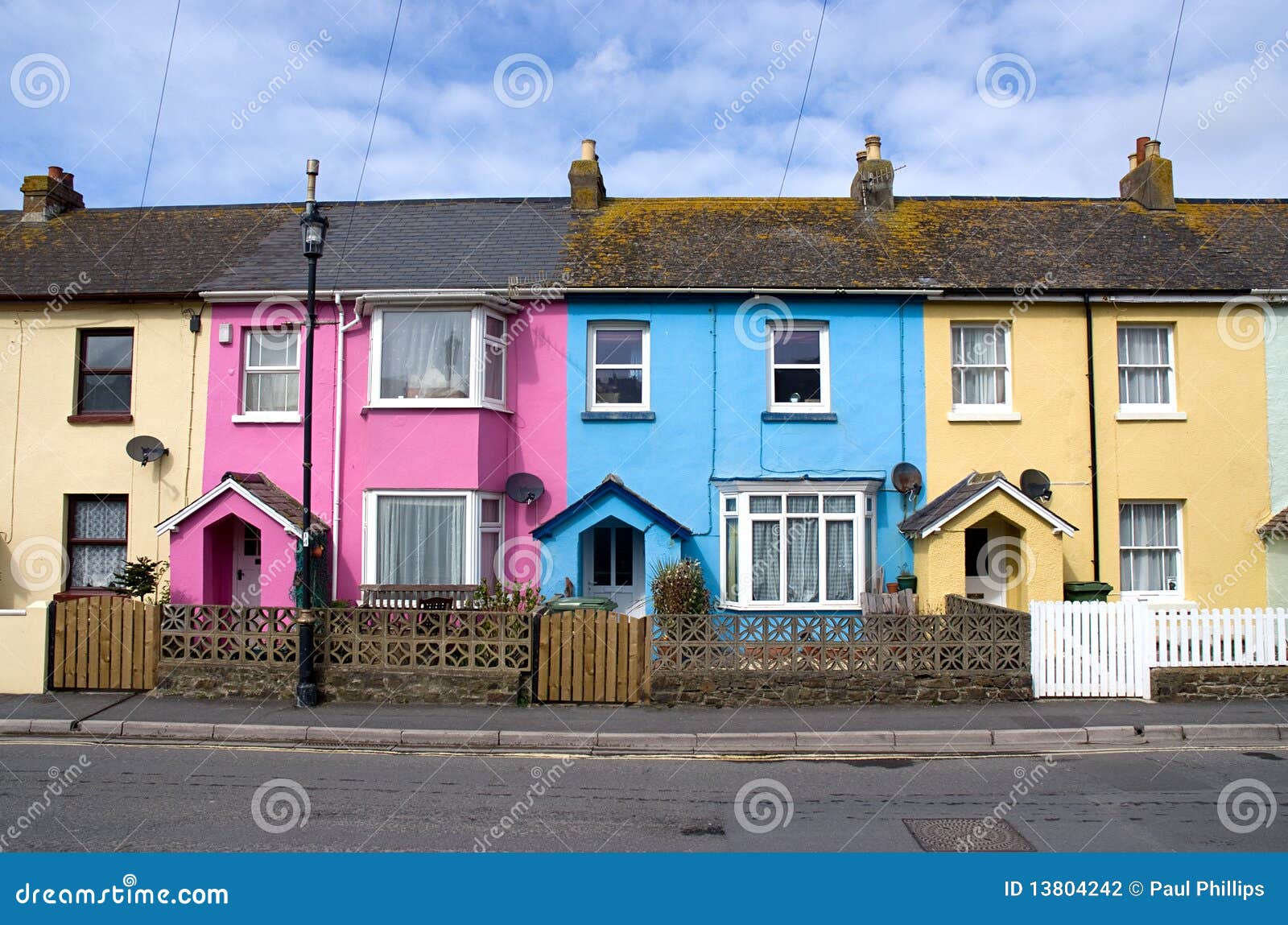 Row of small houses stock photo. Image of blue, yellow - 13804242