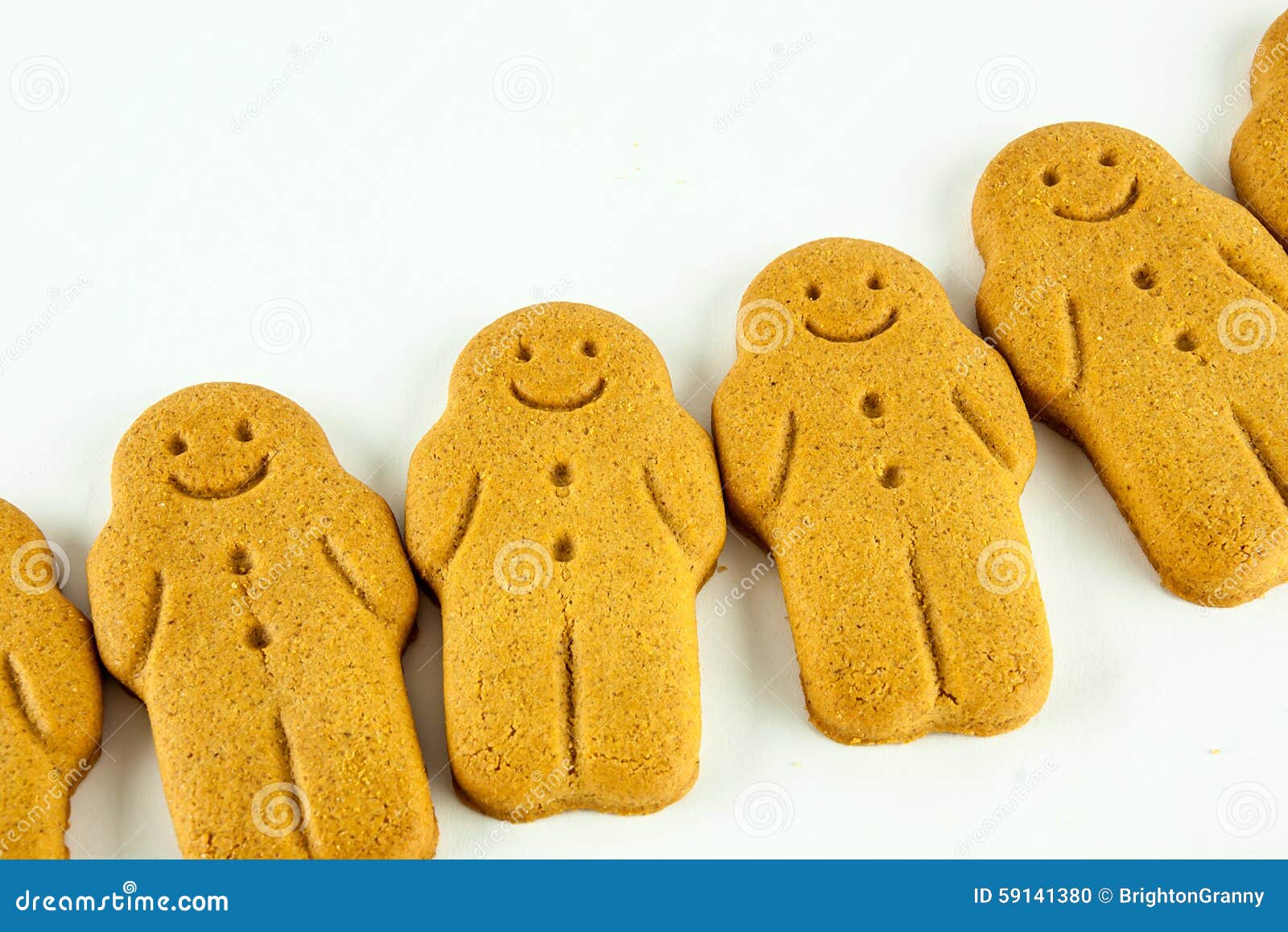 Row of Smiling Gingerbread Men Stock Photo - Image of bread, goods ...
