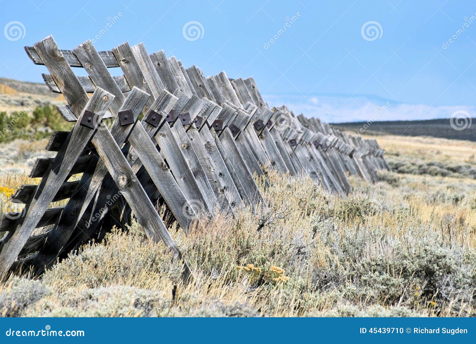 Row of Snow Fence stock photo. Image of scenic, snow - 45439710