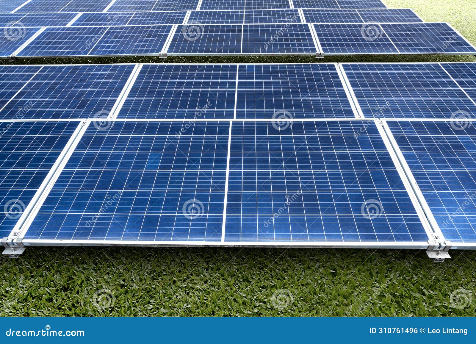 A row of solar cell panels stock photo. Image of clean - 310761496