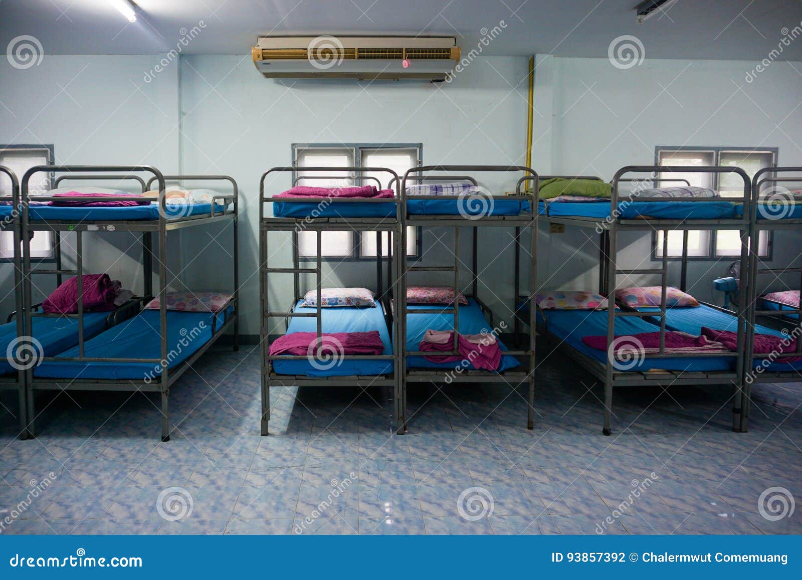 A row soldier bunk beds. stock photo. Image of beds, bunk - 93857392