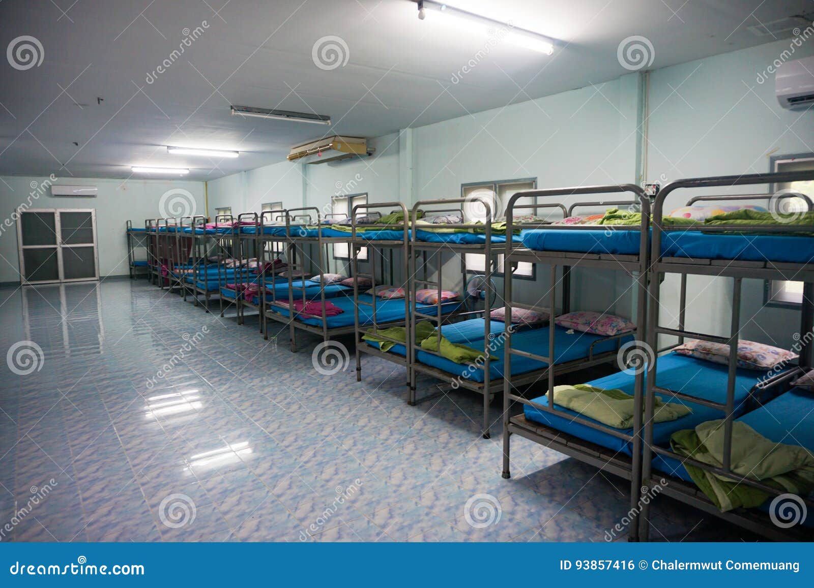 A row soldier bunk beds. stock photo. Image of architecture - 93857416