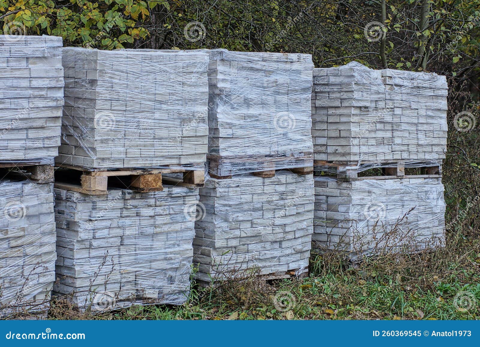 Row on Square Boxes in Plastic Packaging with Paving Bricks Stock Image ...