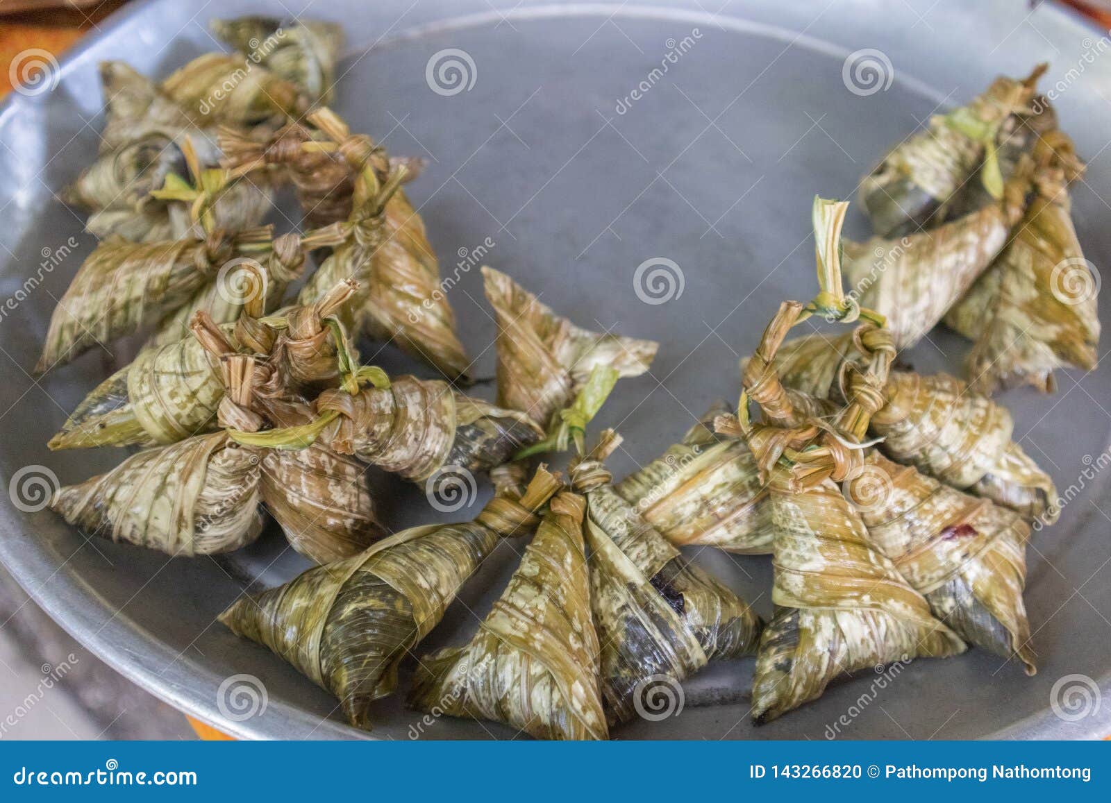 Sticky Rice Wrapped in Banana Leaves Stock Photo - Image of glutinous ...