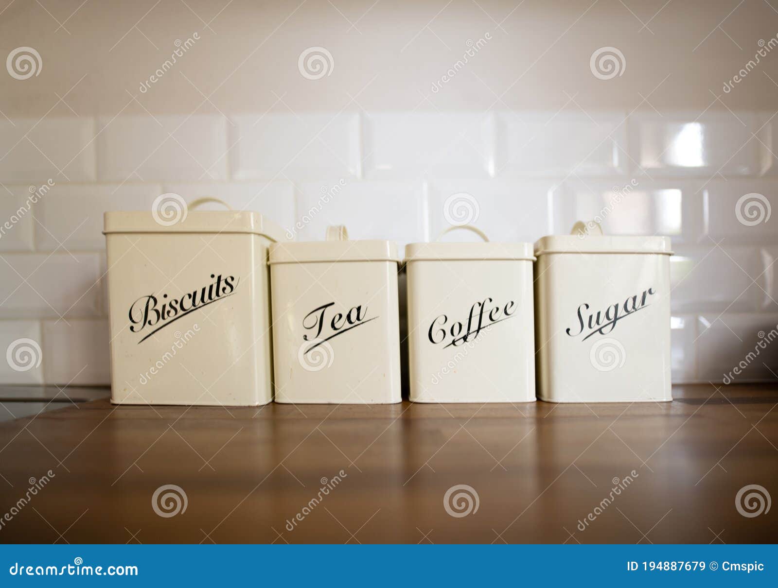 Row of storage tins stock image. Image of worktop, kitchenware - 194887679