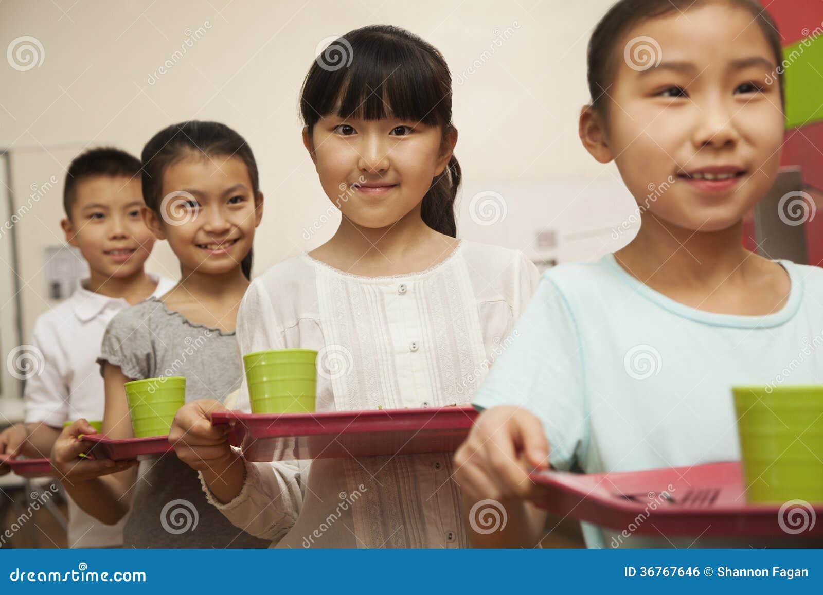 Row of Students Standing in Line in School Cafeteria Stock Photo ...