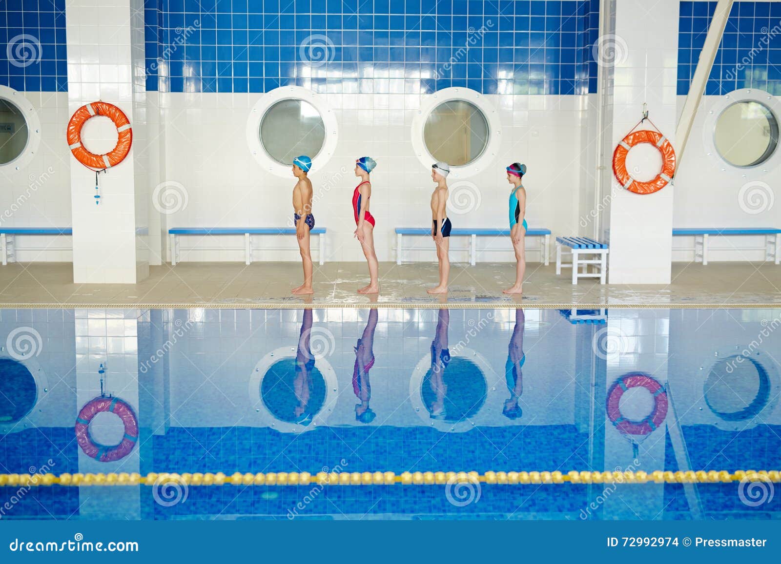 Row of swimmers stock photo. Image of portrait, handsome - 72992974
