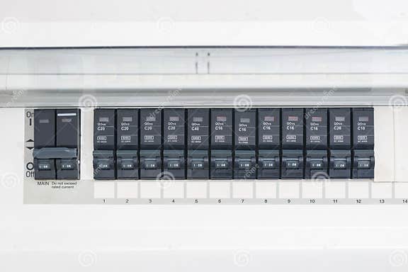 A Row of Switched Off Household Electrical Circuit Breakers on a Wall ...