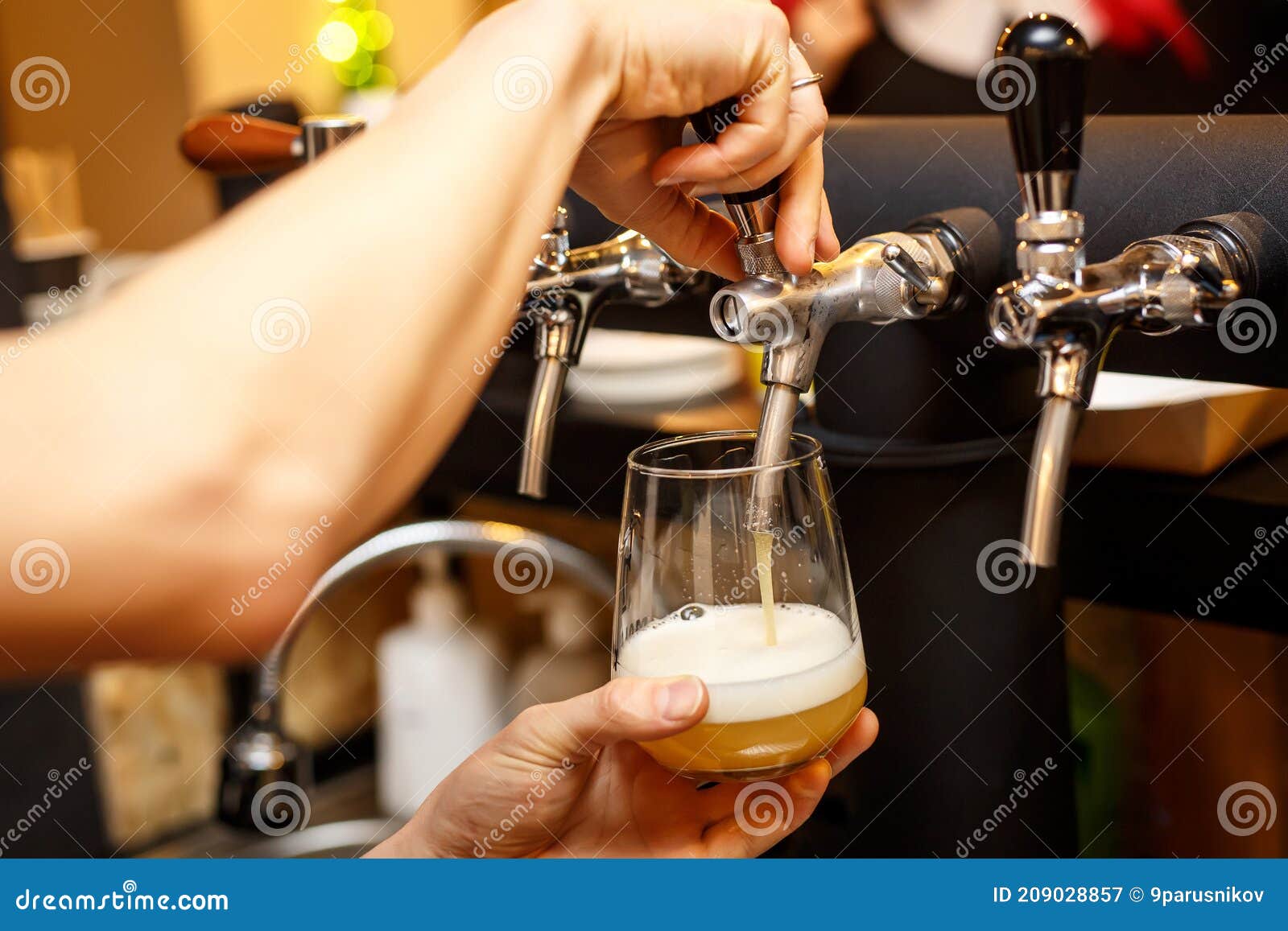Row of taps in a beer tap stock image. Image of alcohol - 209028857