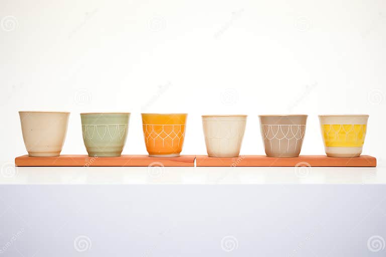 Row of Tea Cups with Different Tea Colors, Side View Stock Photo ...
