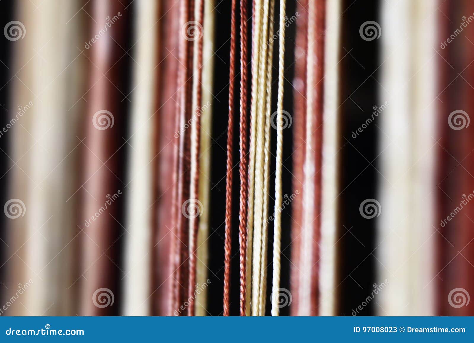 A row of threads stock image. Image of line, assembled - 97008023