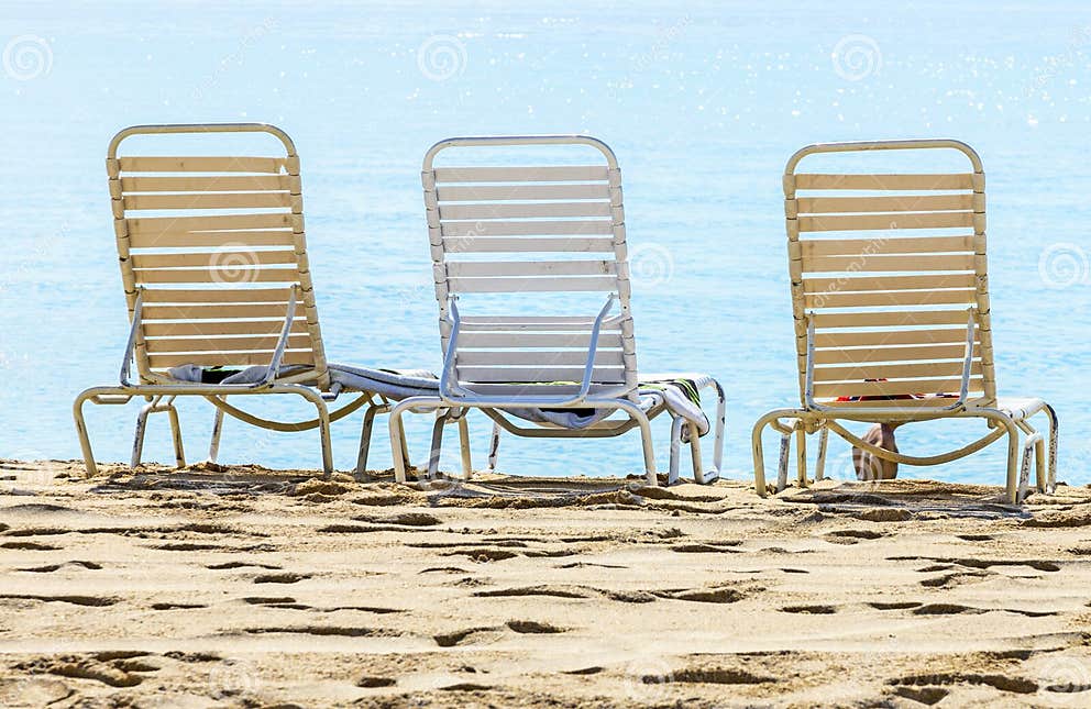 A Row of Three Beach Chairs Stock Image - Image of seat, sunshine: 32979693
