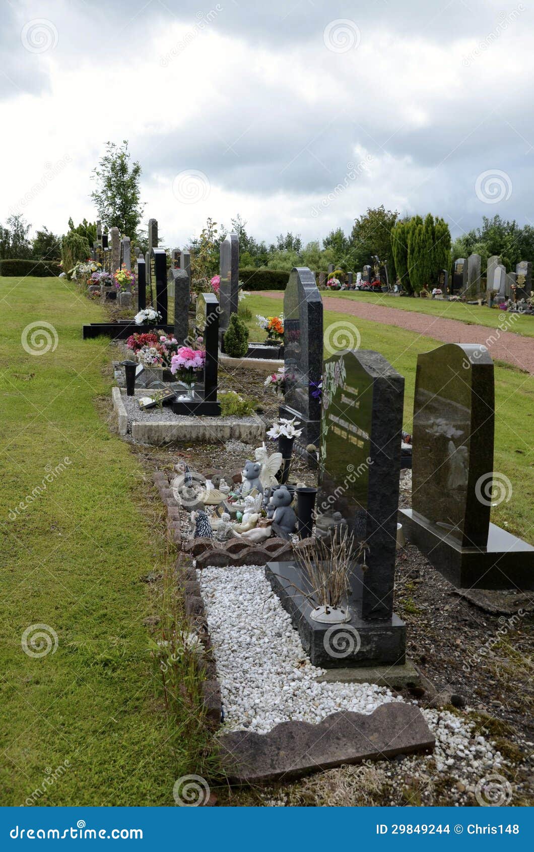 Tombstones at a graveyard stock photo. Image of religious - 29849244