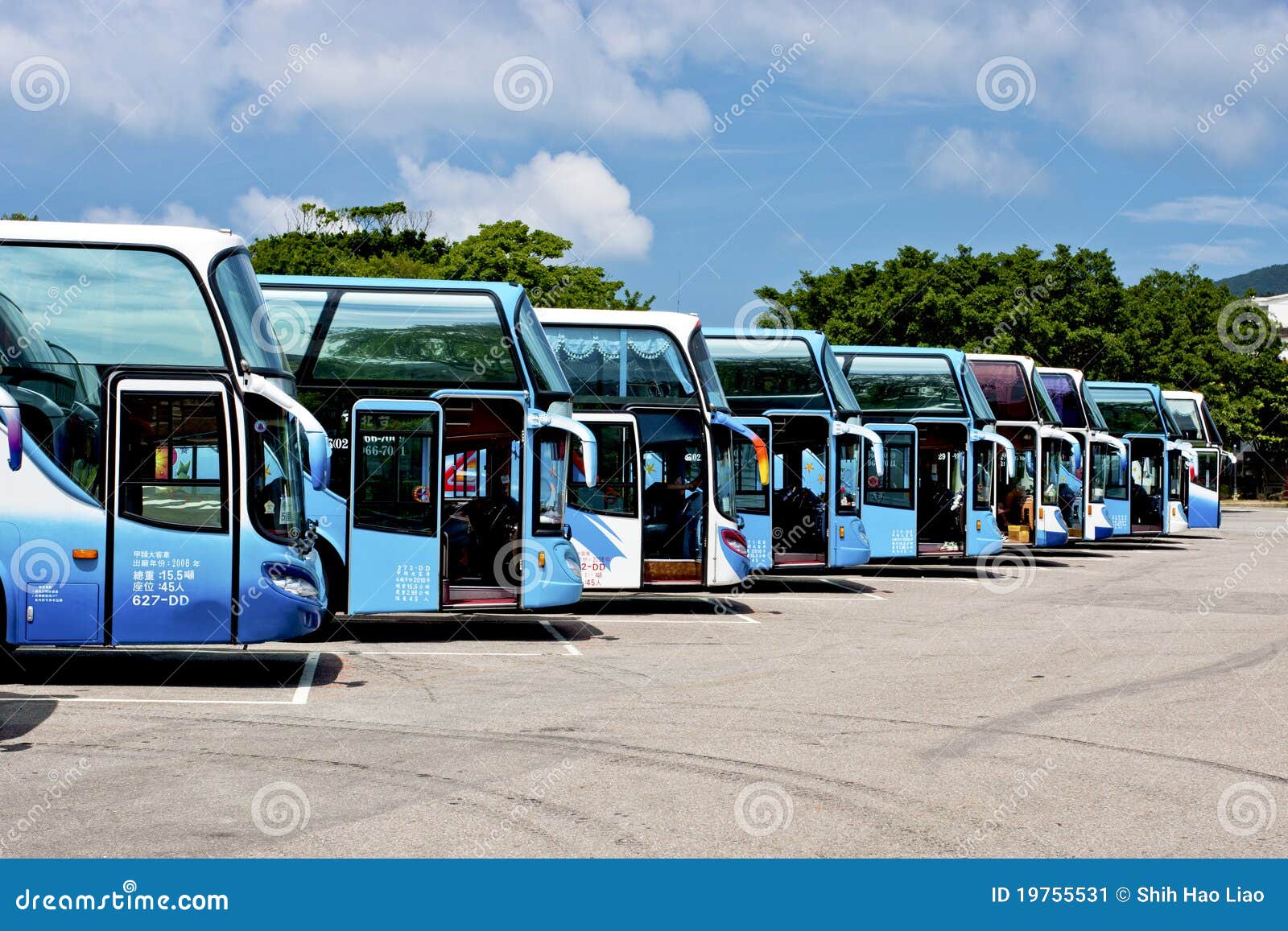 Row of tourist buses stock image. Image of construction - 19755531
