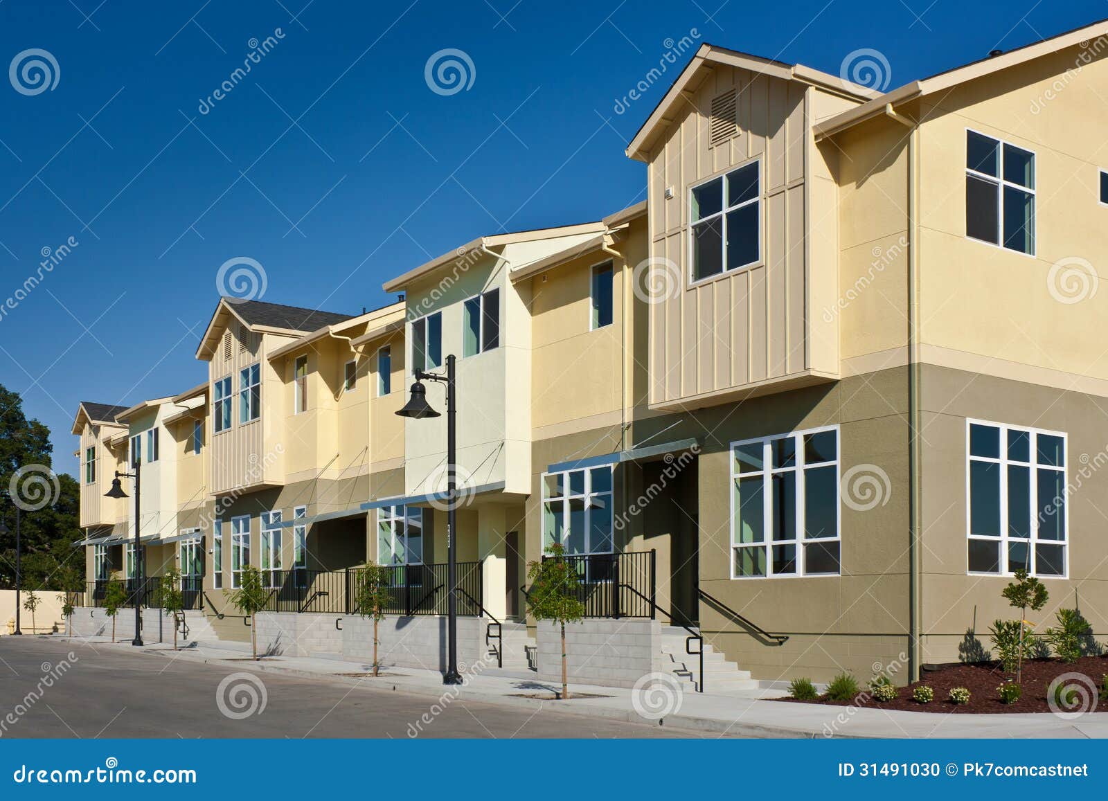 Row of Townhomes stock photo. Image of condominium, multifamily - 31491030