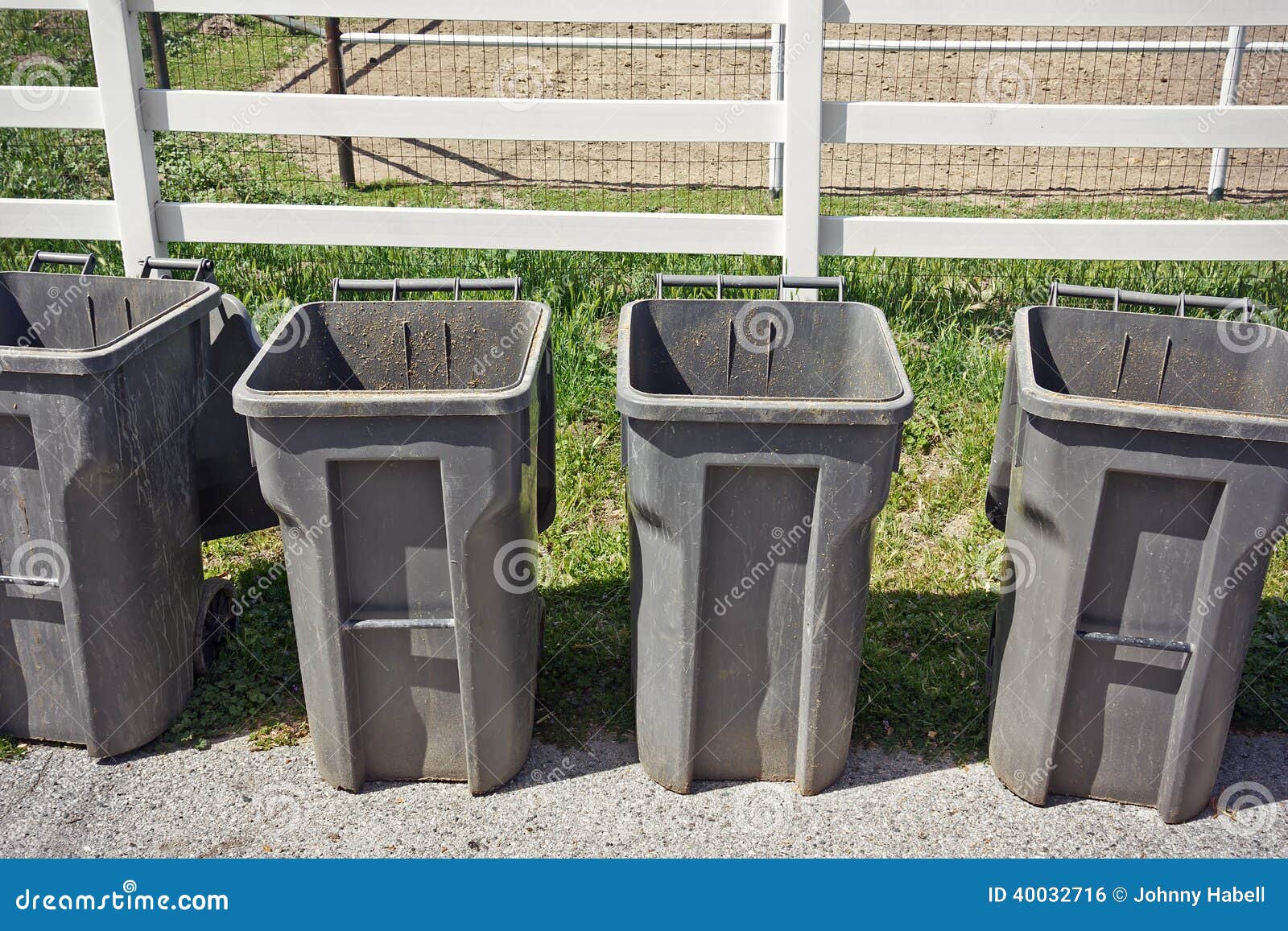 Row of Trash bins stock photo. Image of dispose, grass - 40032716
