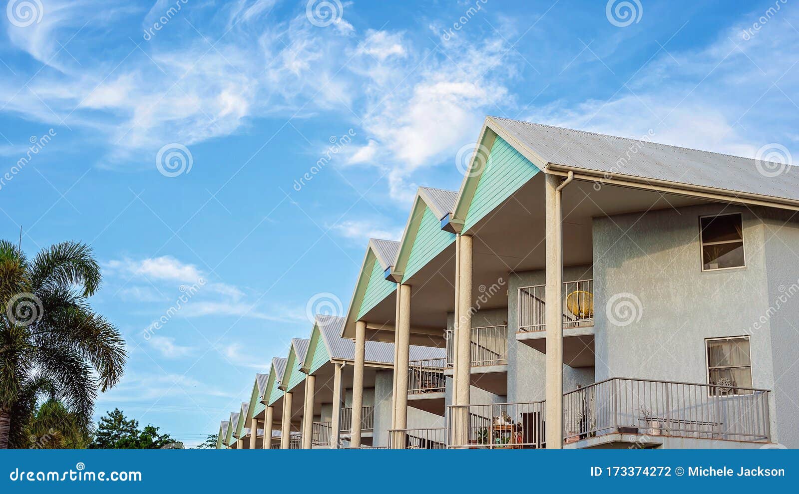 Row of Triangle Shaped Roofs Stock Photo - Image of balconies, concrete ...