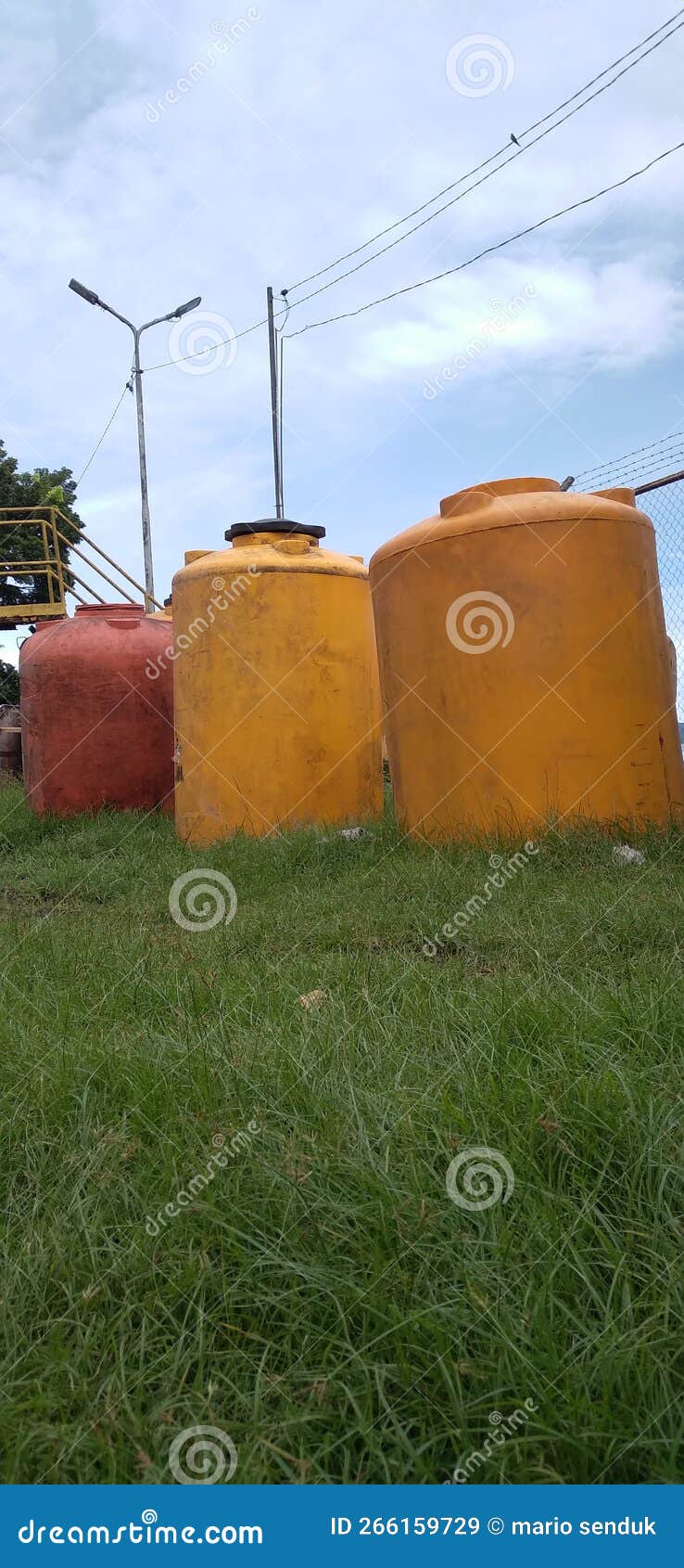 Row of used water tanks stock image. Image of wood, used - 266159729