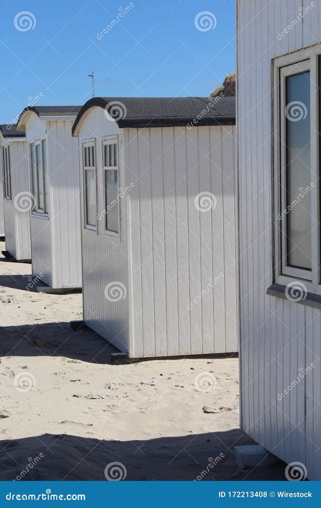 Row of White Cabins on the Lokken Beach, Denmark Stock Photo - Image of ...