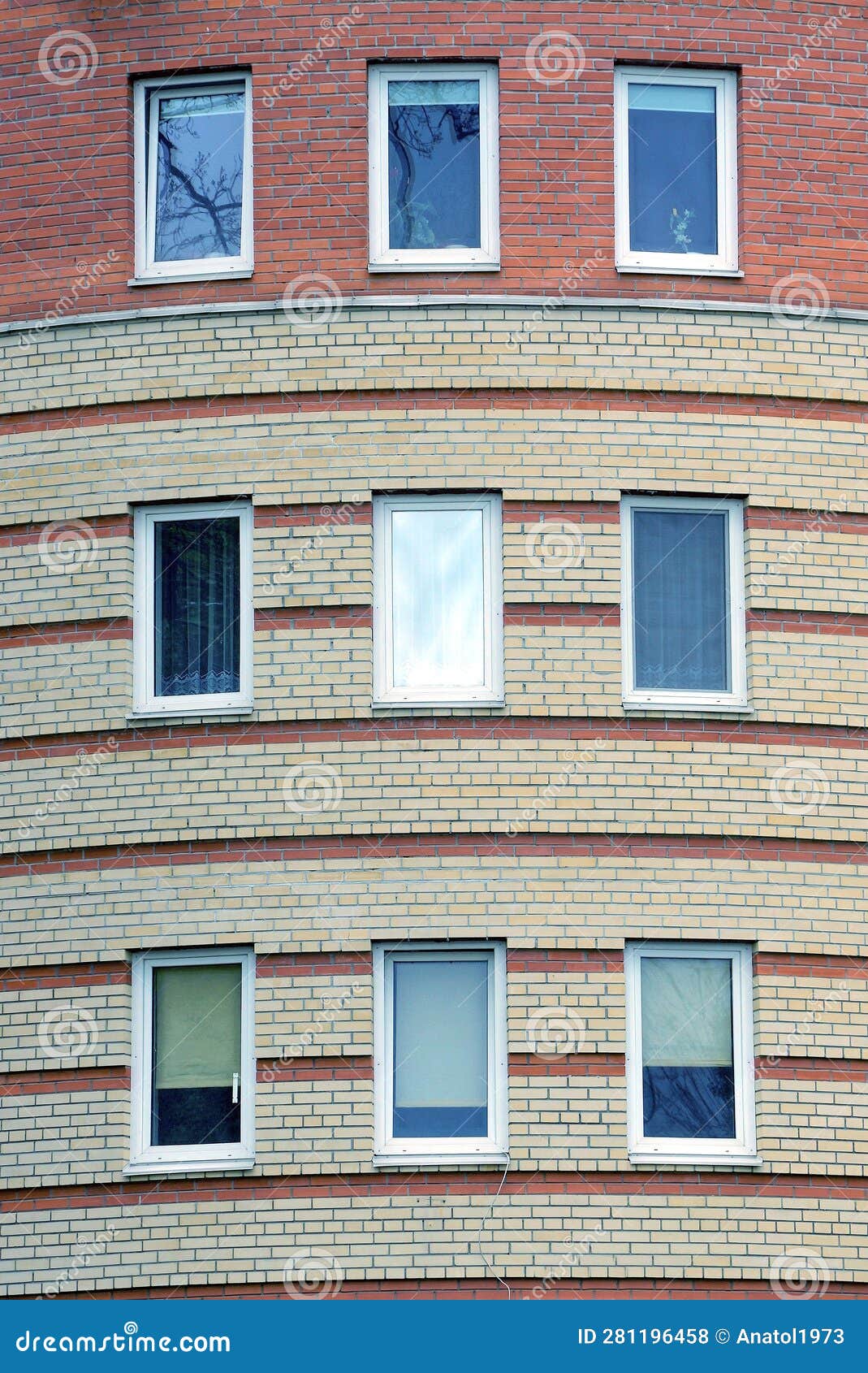 A Row of White Rectangular Windows on a Brown Brick Wall Stock Photo ...