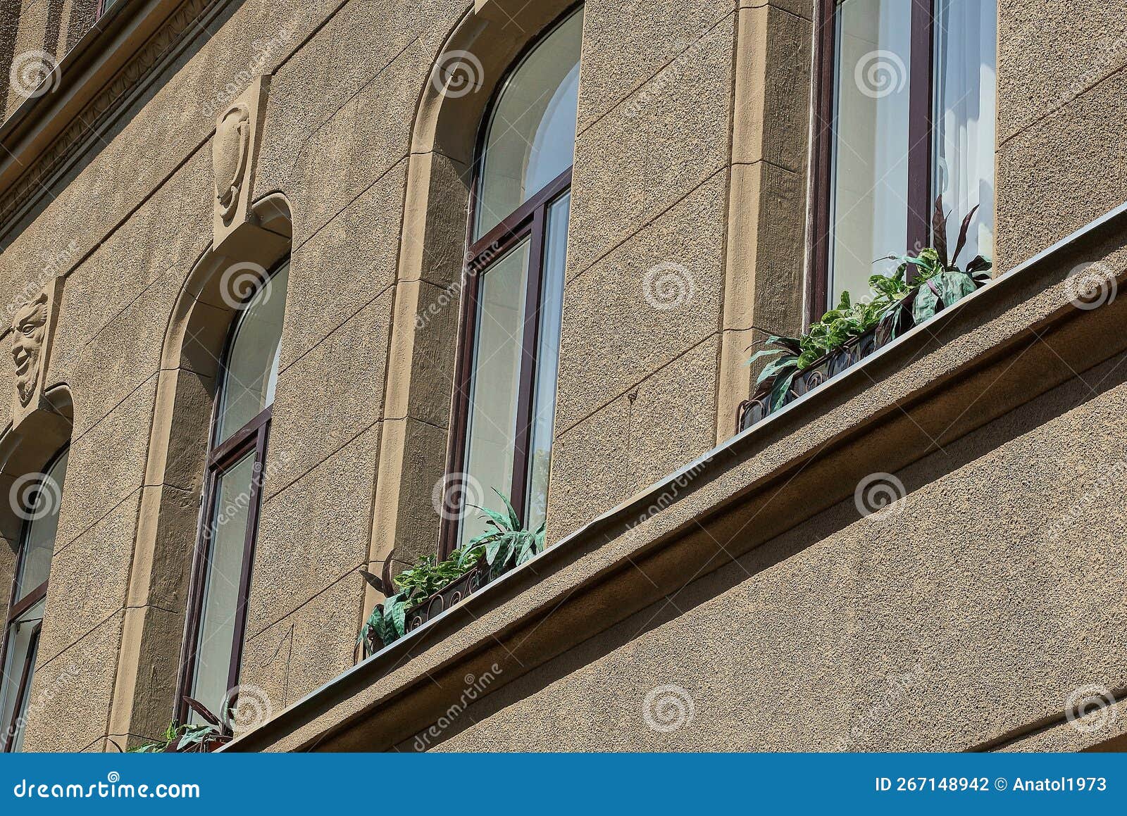 A Row of Windows on a Brown Stone Wall Stock Photo - Image of exterior ...
