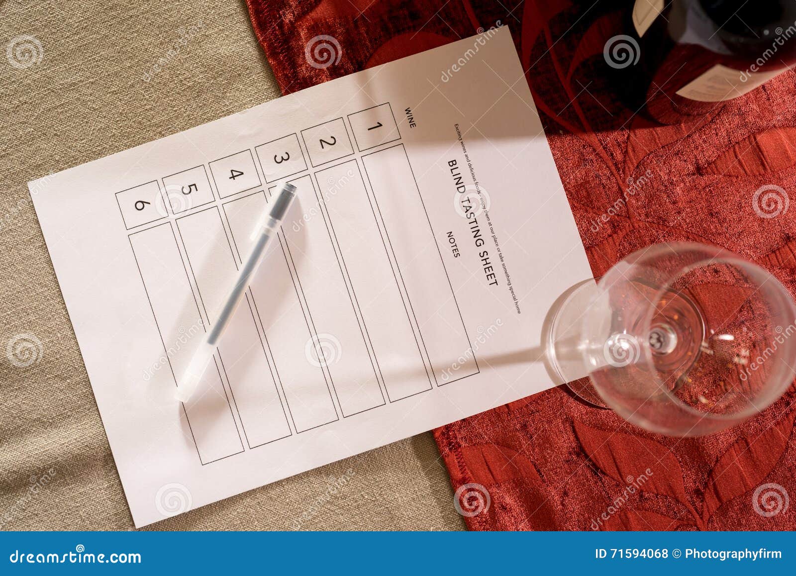 Row of Wine Bottles with Glasses and Tasting Forms Stock Photo - Image ...