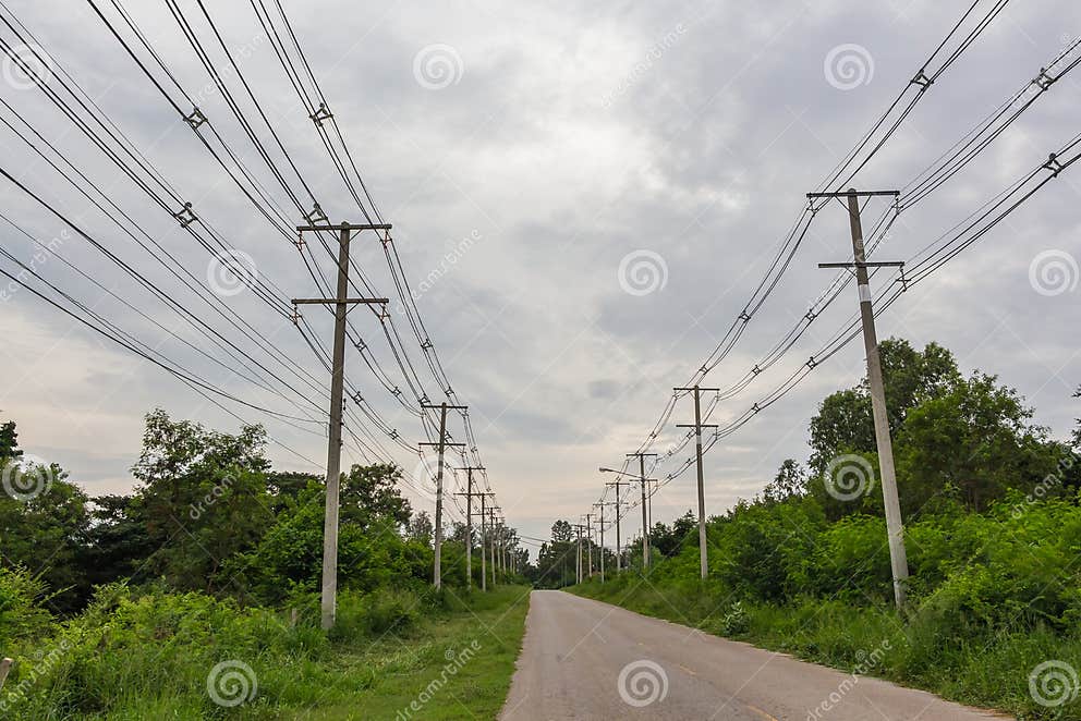 Row of wire electric pole stock photo. Image of generation - 91899504